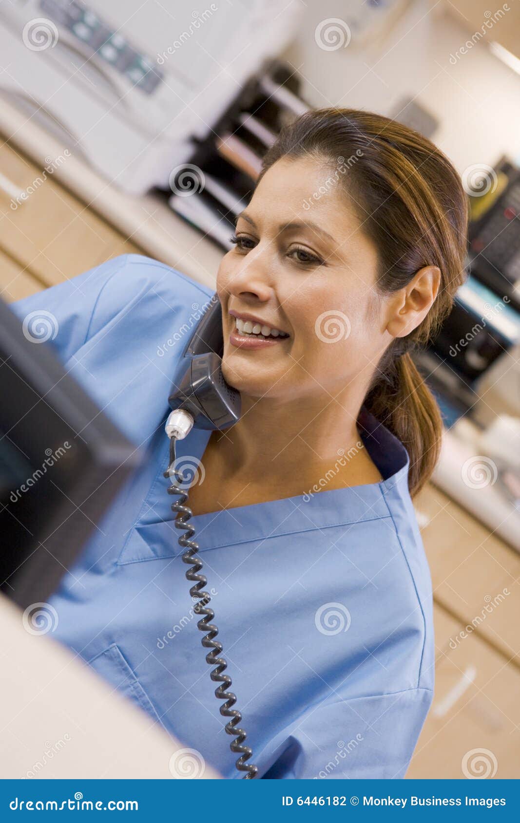 A Nurse on the Telephone stock photo. Image of station - 6446182