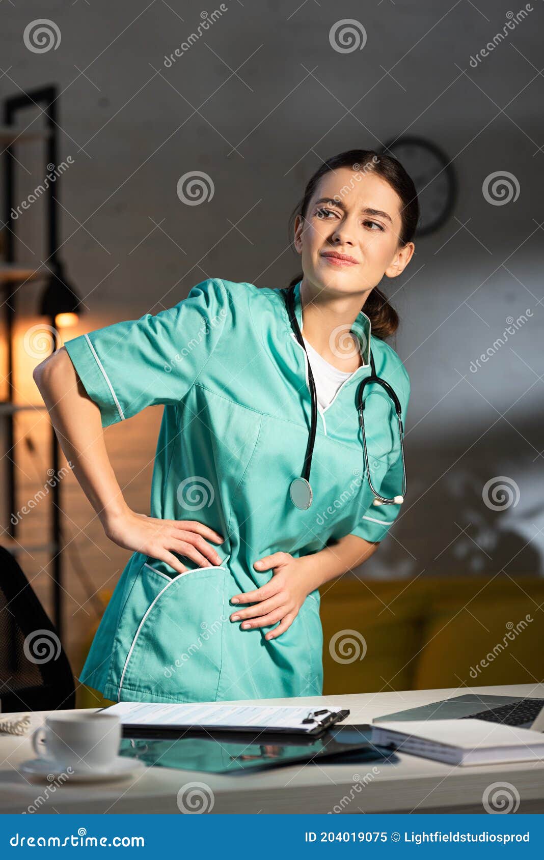 Nurse in Uniform Having Back Pain Stock Image - Image of beautiful ...