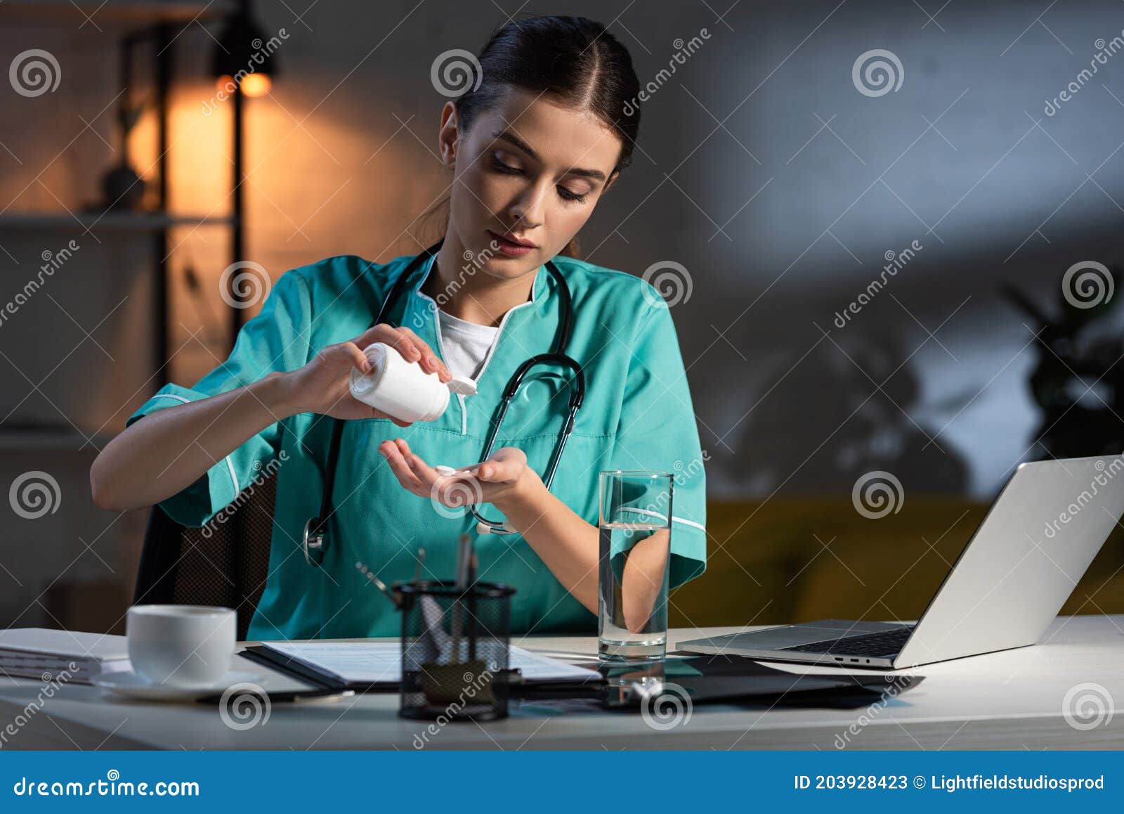 Nurse in Uniform Sitting at Table Stock Image - Image of beverages ...