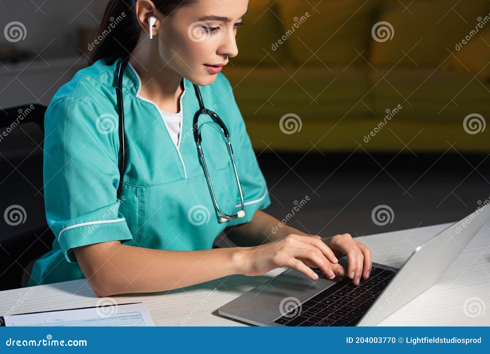Nurse in Uniform Sitting at Table Stock Photo - Image of indoors, nurse ...