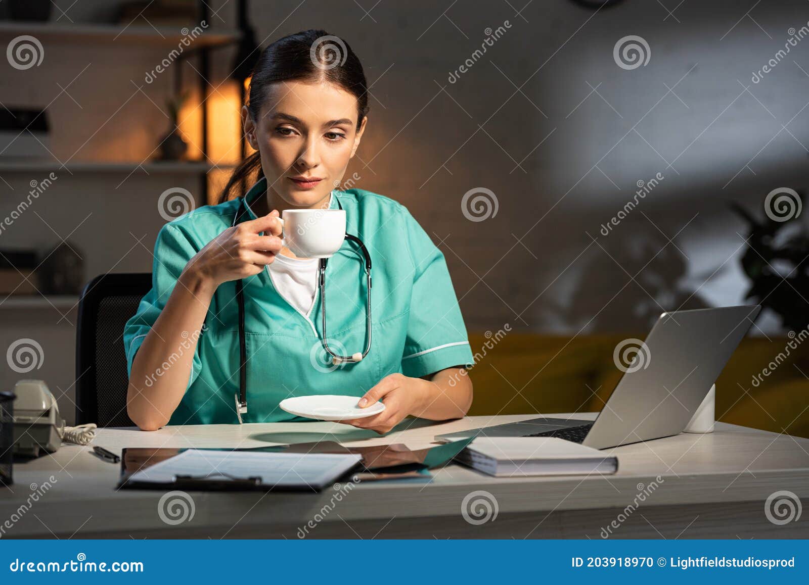 Nurse in Uniform Sitting at Table Stock Photo - Image of medical ...