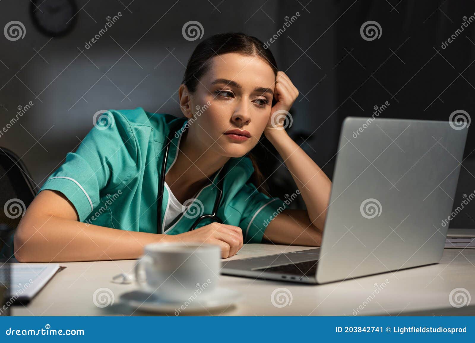 Nurse in Uniform Sitting at Table Stock Image - Image of profession ...