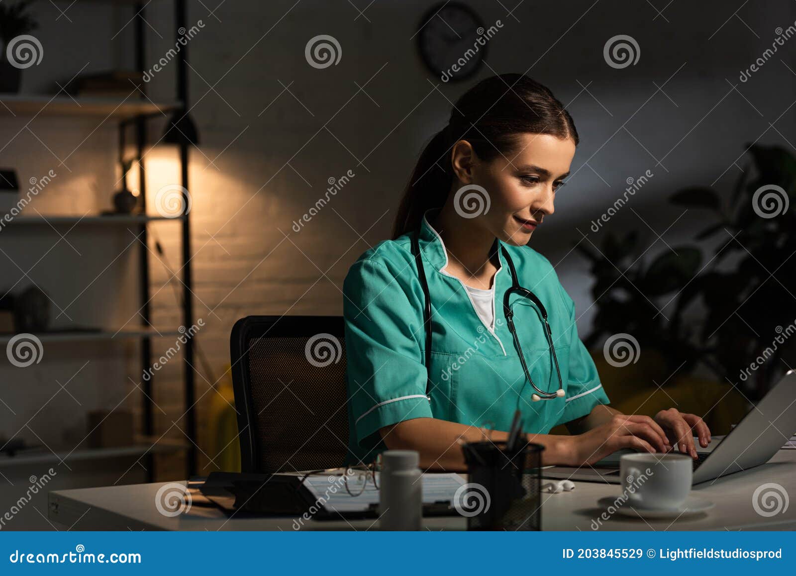 Nurse in Uniform Sitting at Table Stock Image - Image of equipment ...