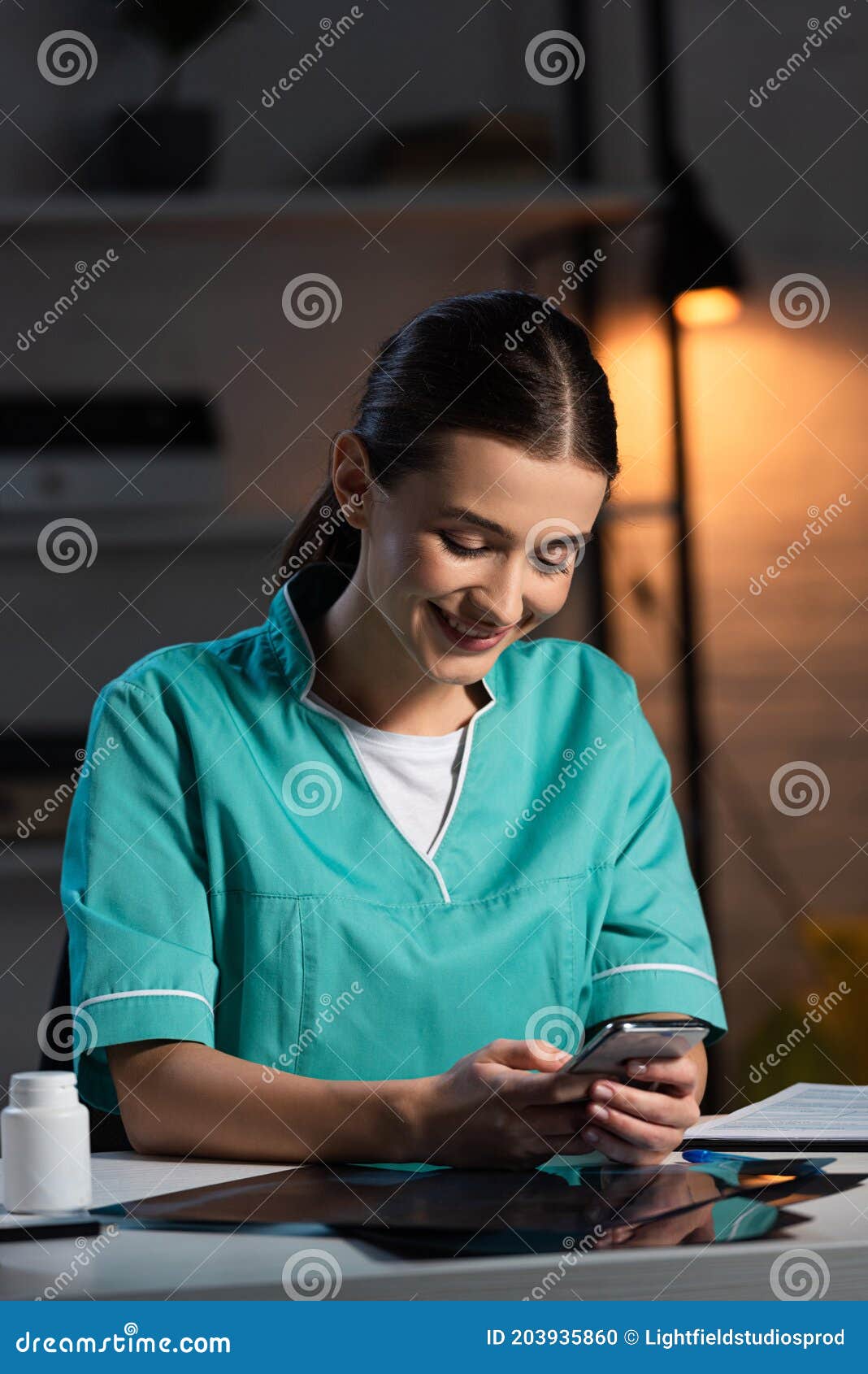 Nurse in Uniform Sitting at Table Stock Photo - Image of cheerful ...