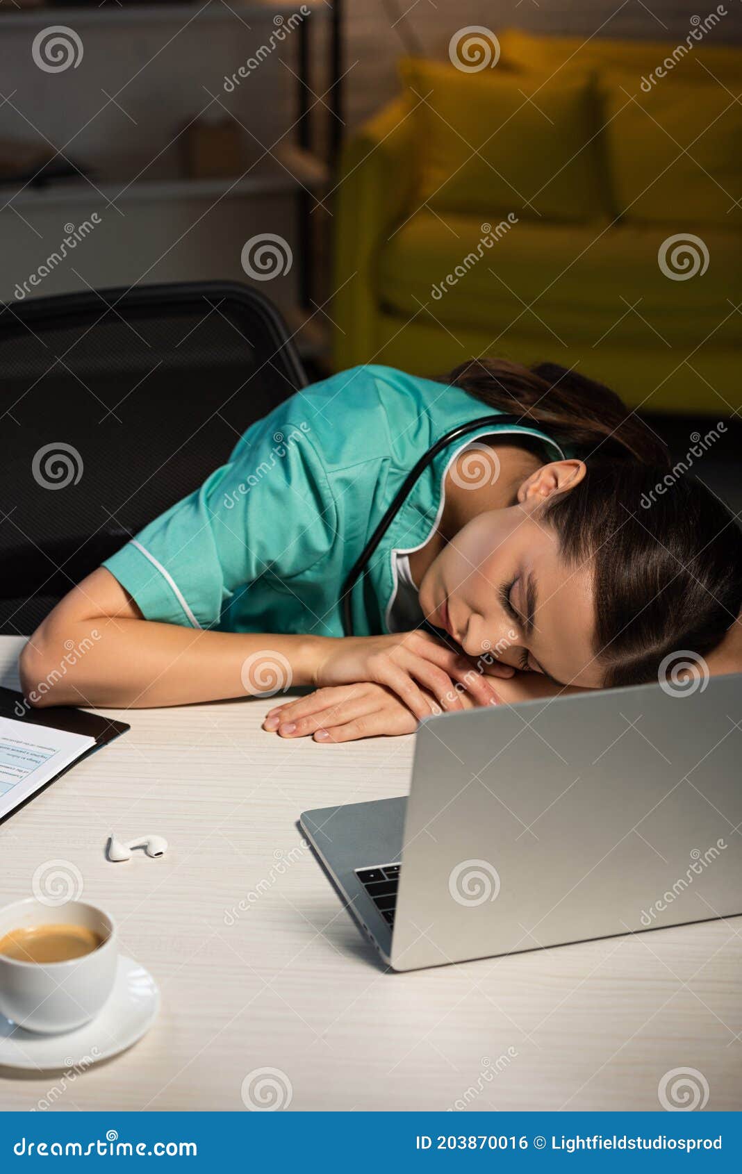 Nurse in Uniform Sleeping on Table Stock Photo - Image of laptop ...