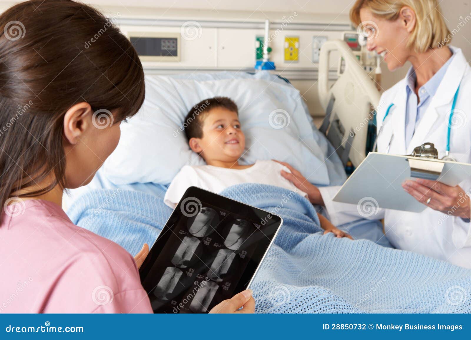 Nurse Using Digital Tablet Whilst Visiting Patient Stock Photo - Image ...
