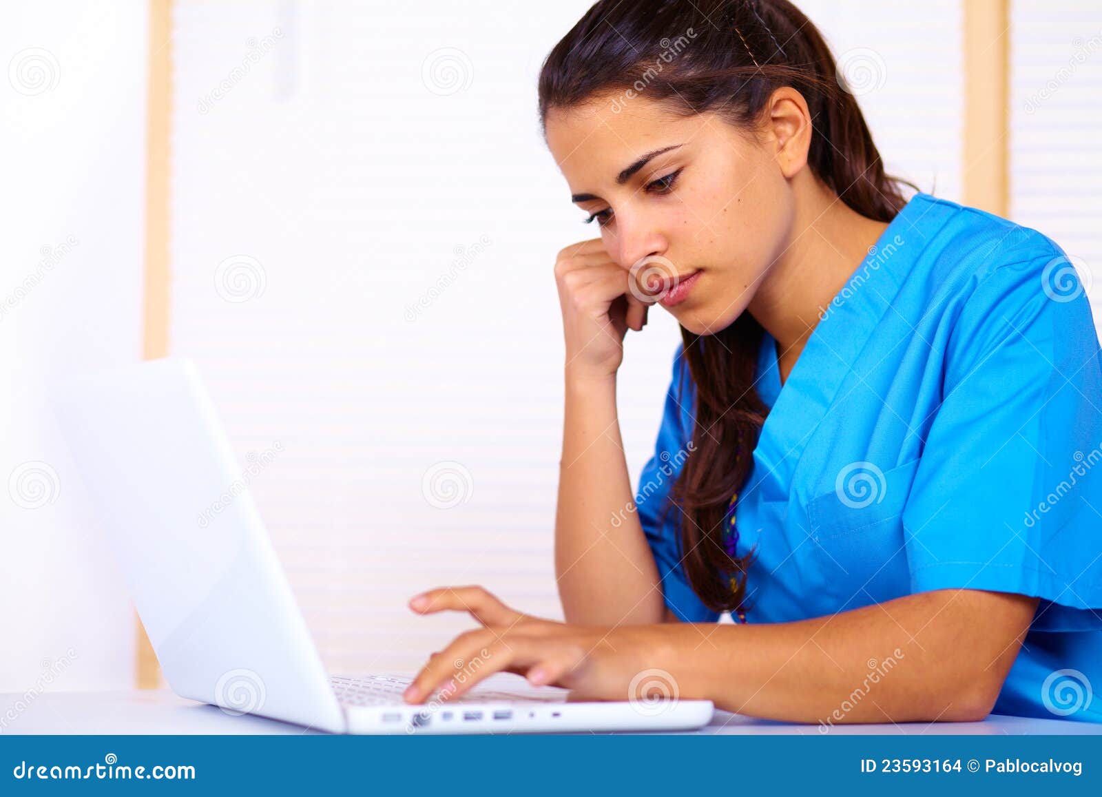 Nurse using a laptop stock photo. Image of modern, people - 23593164