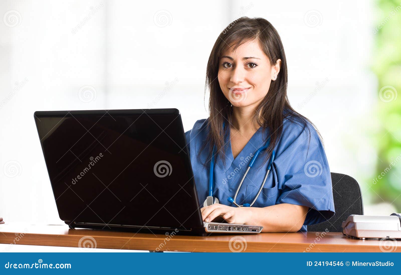 Nurse using a laptop stock photo. Image of blue, nurse - 24194546