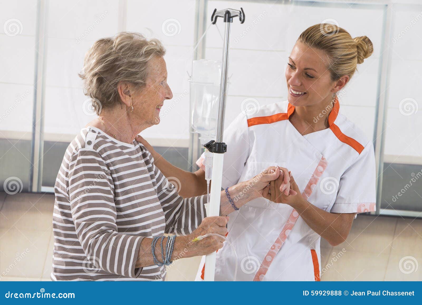 Nurse Walking Next To A Patient With IV Drip Royalty-Free Stock Image ...