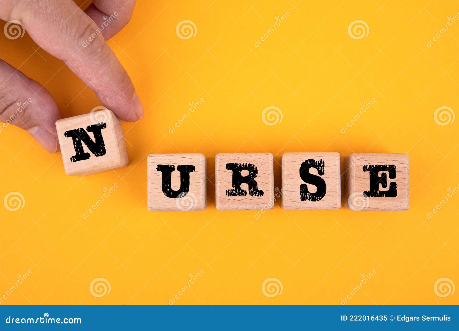 NURSE. Wooden Cubes with Text on a Yellow Background Stock Image ...