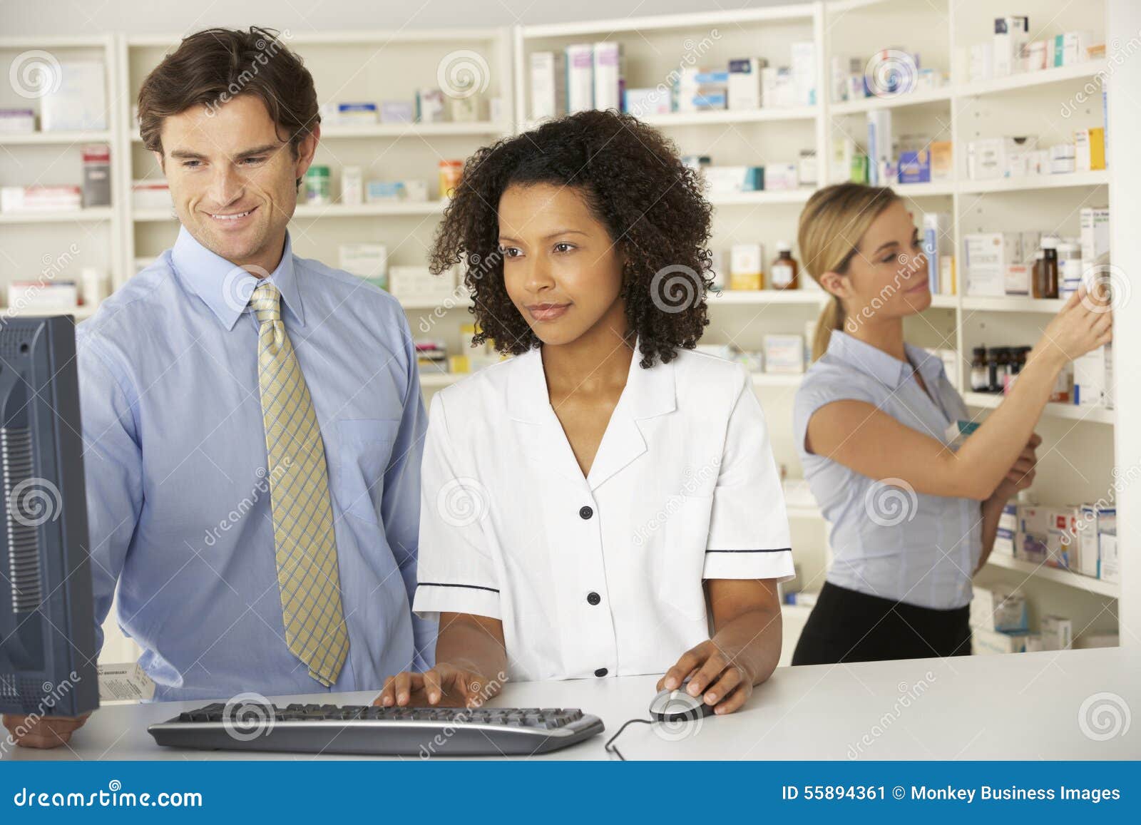 Nurse Working on Computer in Pharmacy Stock Image - Image of computer ...