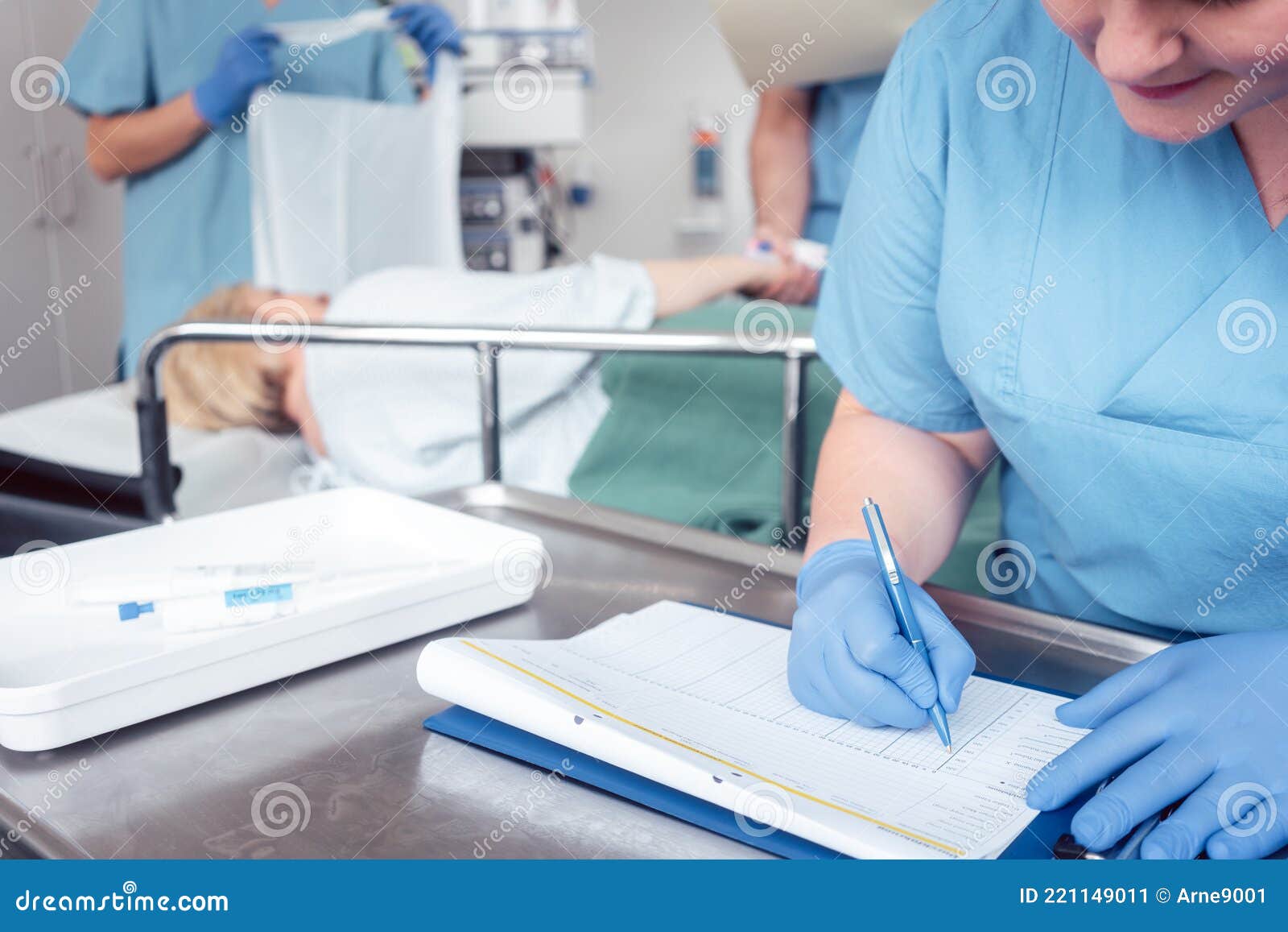 Nurse Writing Pre Surgery Report on File Stock Image - Image of clinic ...