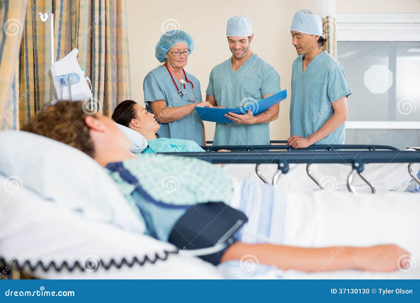 Nurses Examining Patient S Report Stock Photo - Image of colleague ...