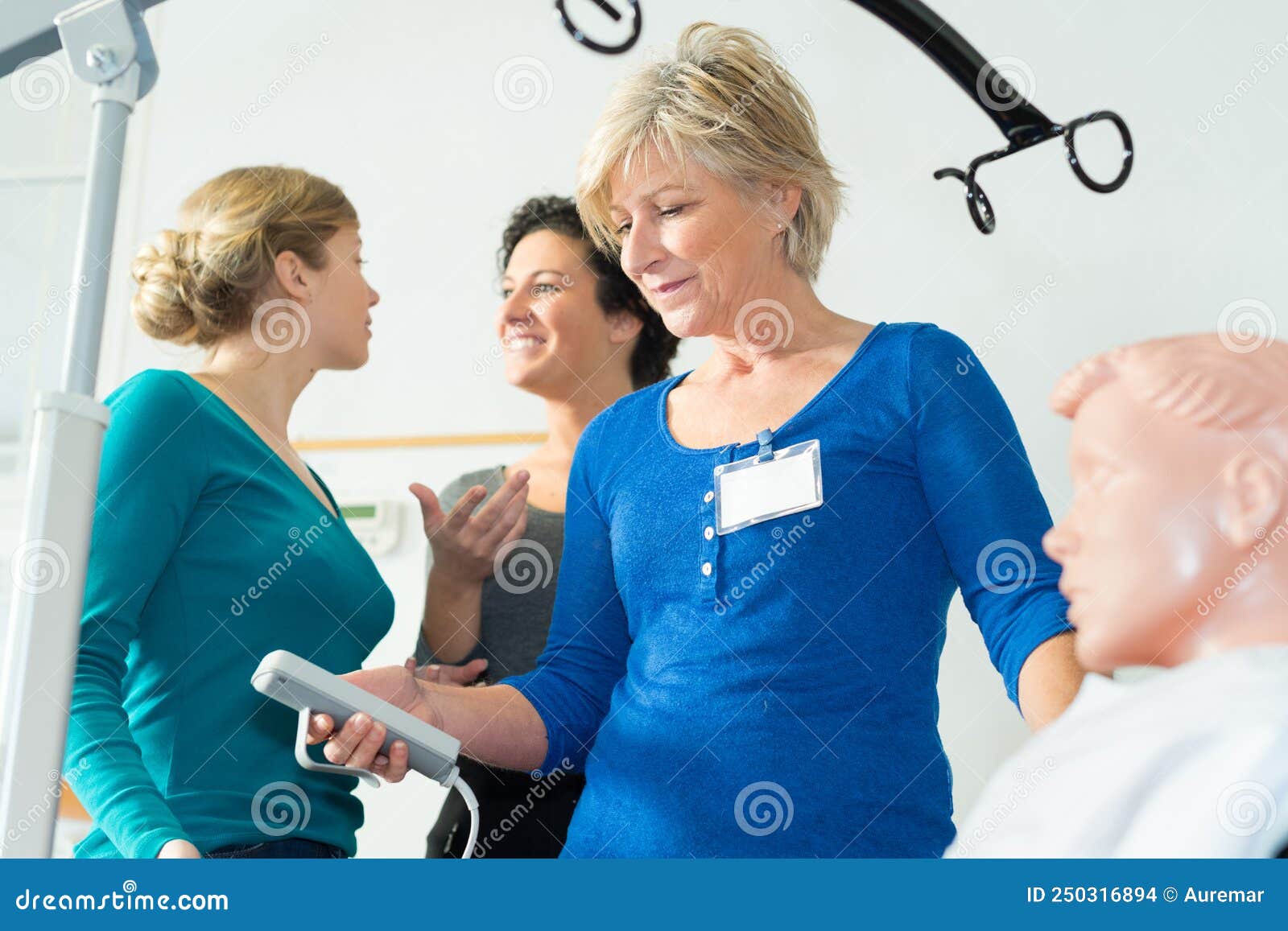 Nurses with Mannequin Training To Use Hoist Stock Photo - Image of ...