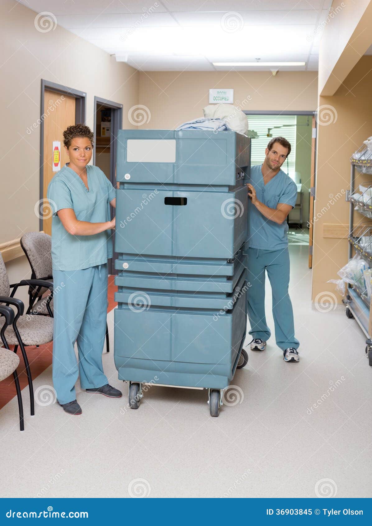 Nurses Pushing Trolley in Hospital Hallway Stock Image - Image of ...