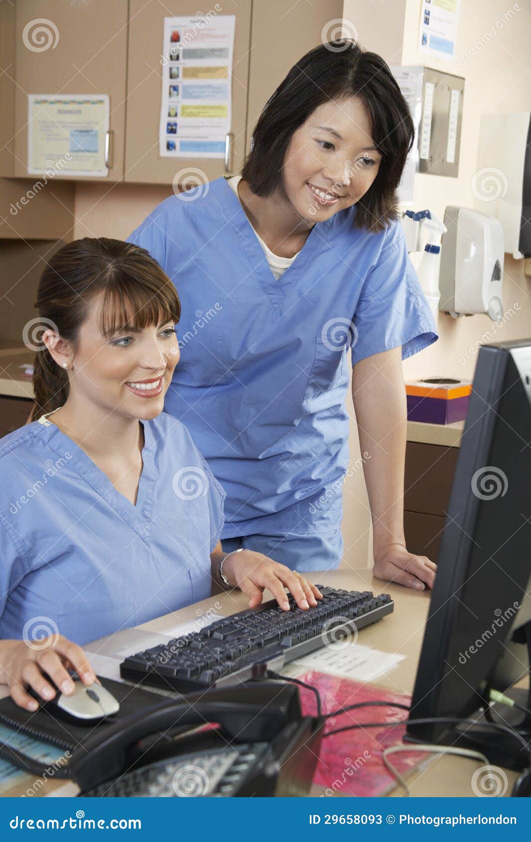 Nurses Using Computer at Clinic Stock Image - Image of health, nurse ...