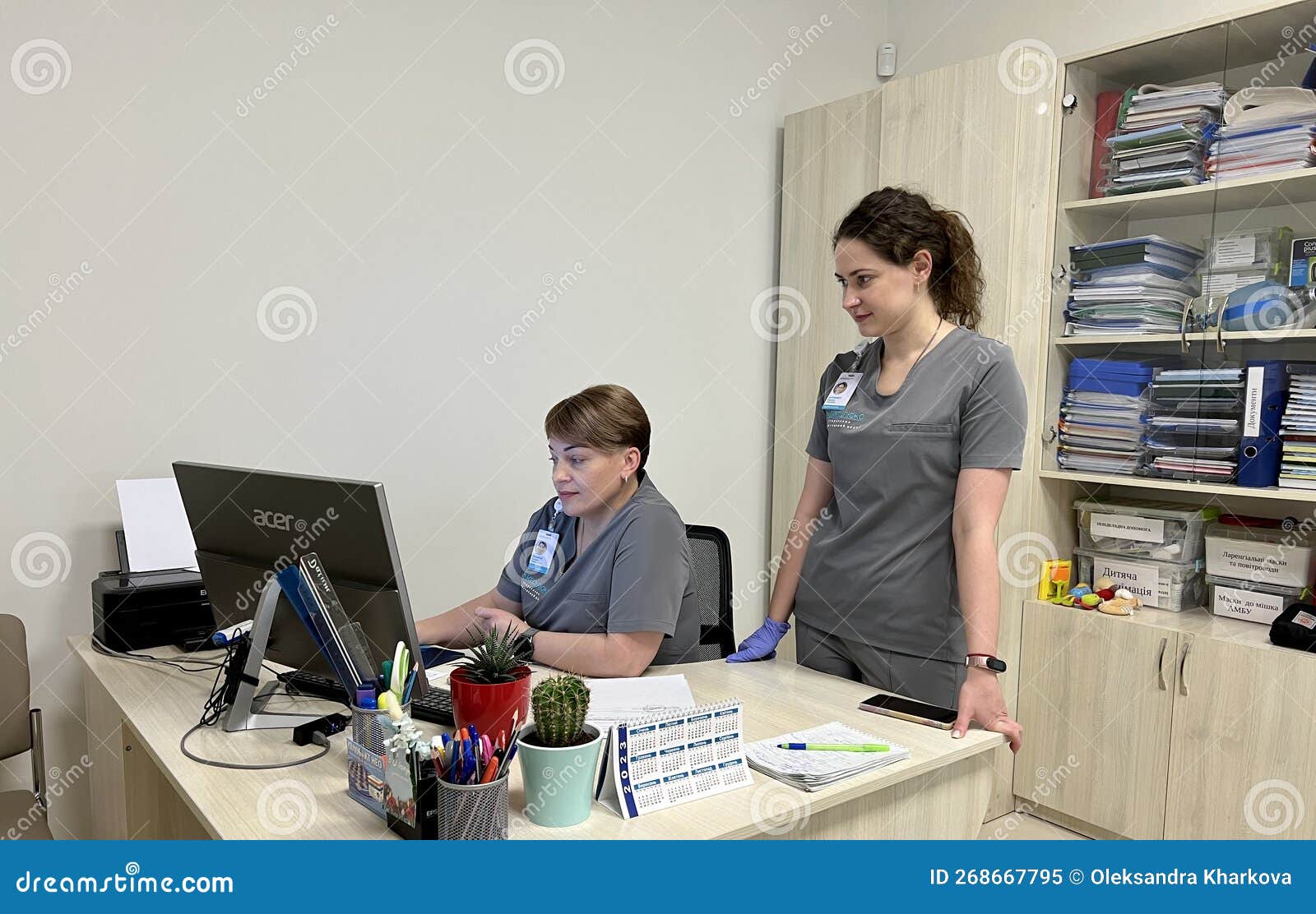 Nurses Working at the Computer in the Hospital Room Latest Wireless ...