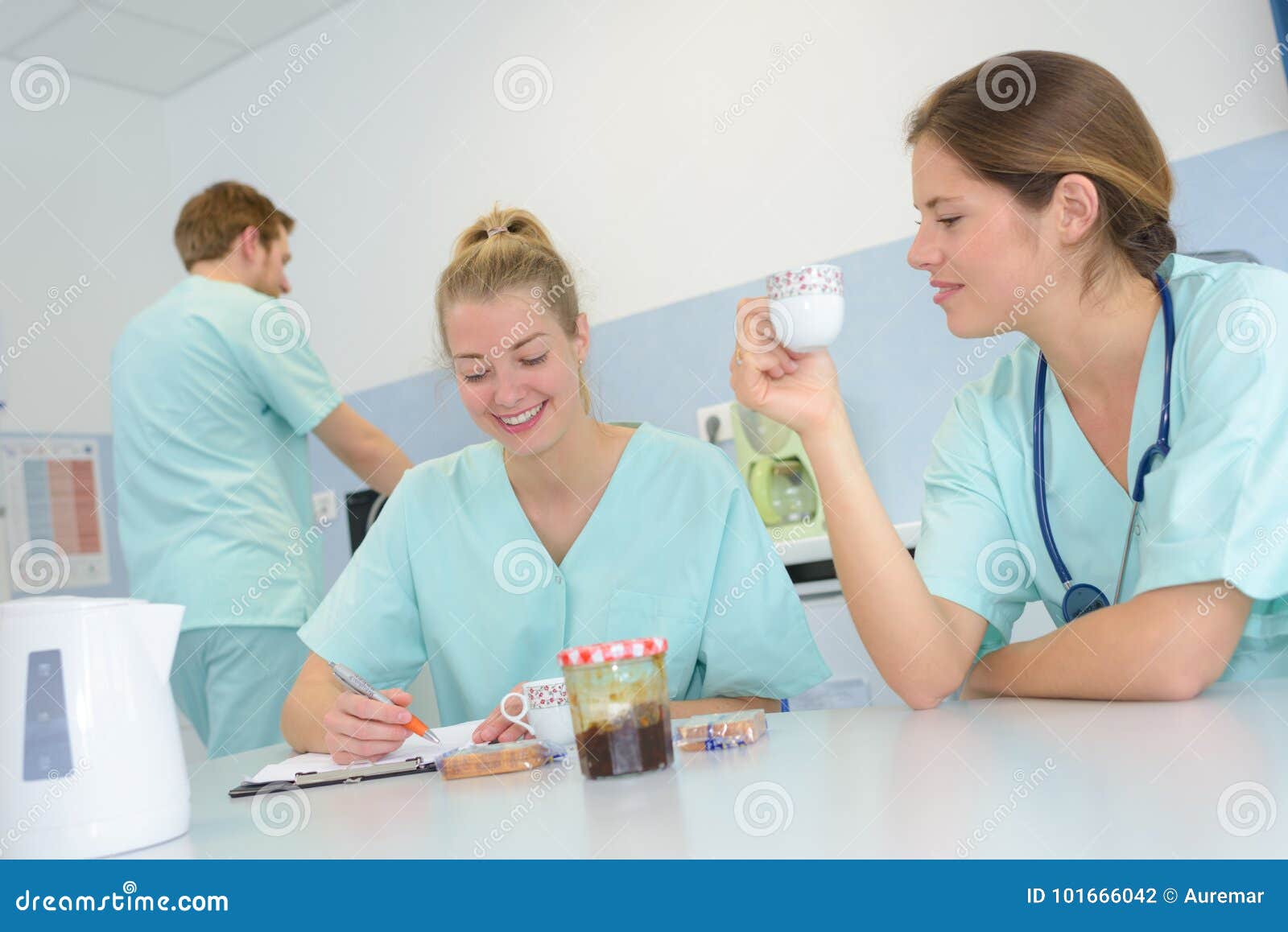 Nursing staff taking break stock photo. Image of uniform - 101666042