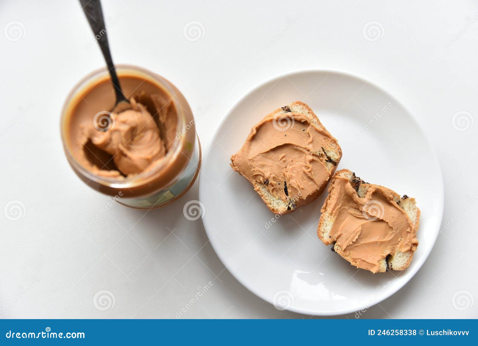 Nut Paste Spread on a Piece of Bread on a Plate Stock Photo - Image of ...