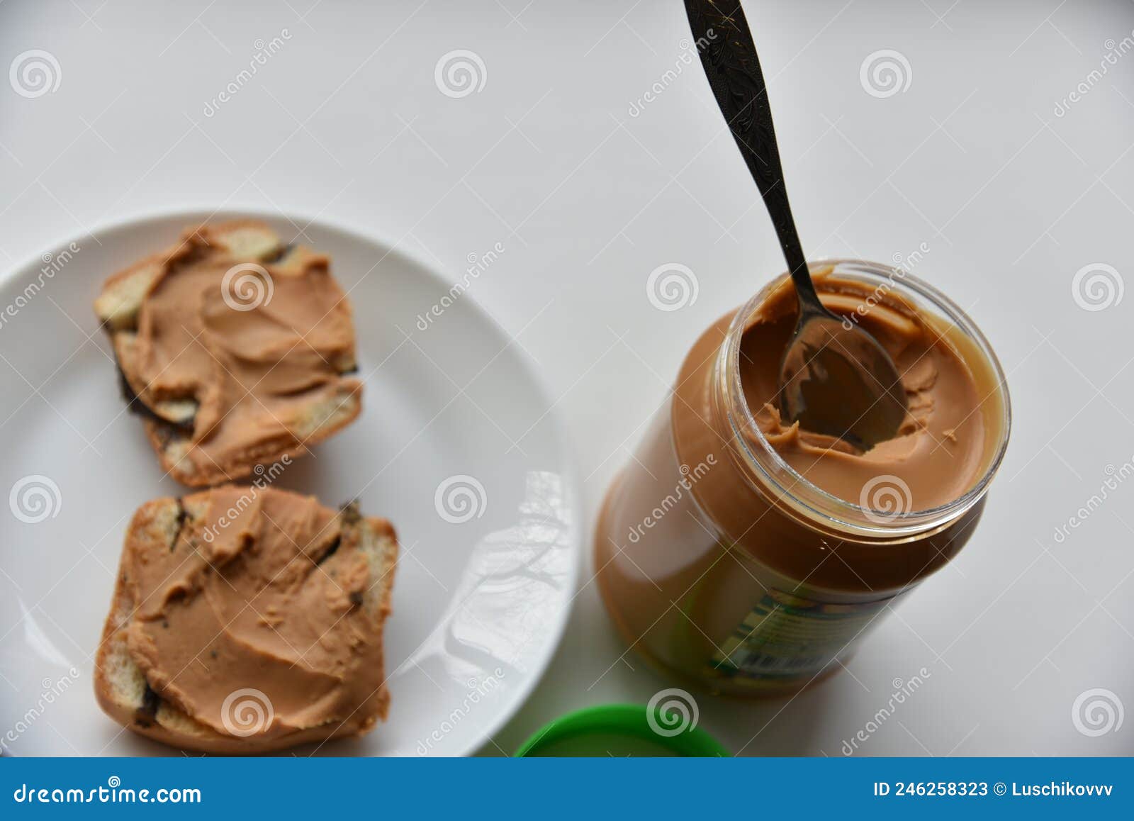 Nut Paste Spread on a Piece of Bread on a Plate Stock Image - Image of ...