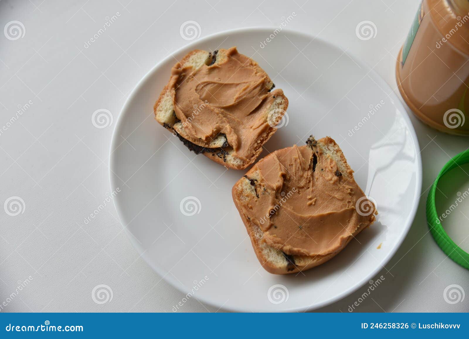 Nut Paste Spread on a Piece of Bread on a Plate Stock Photo - Image of ...
