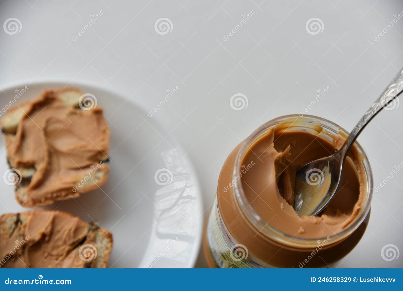 Nut Paste Spread on a Piece of Bread on a Plate Stock Image - Image of ...