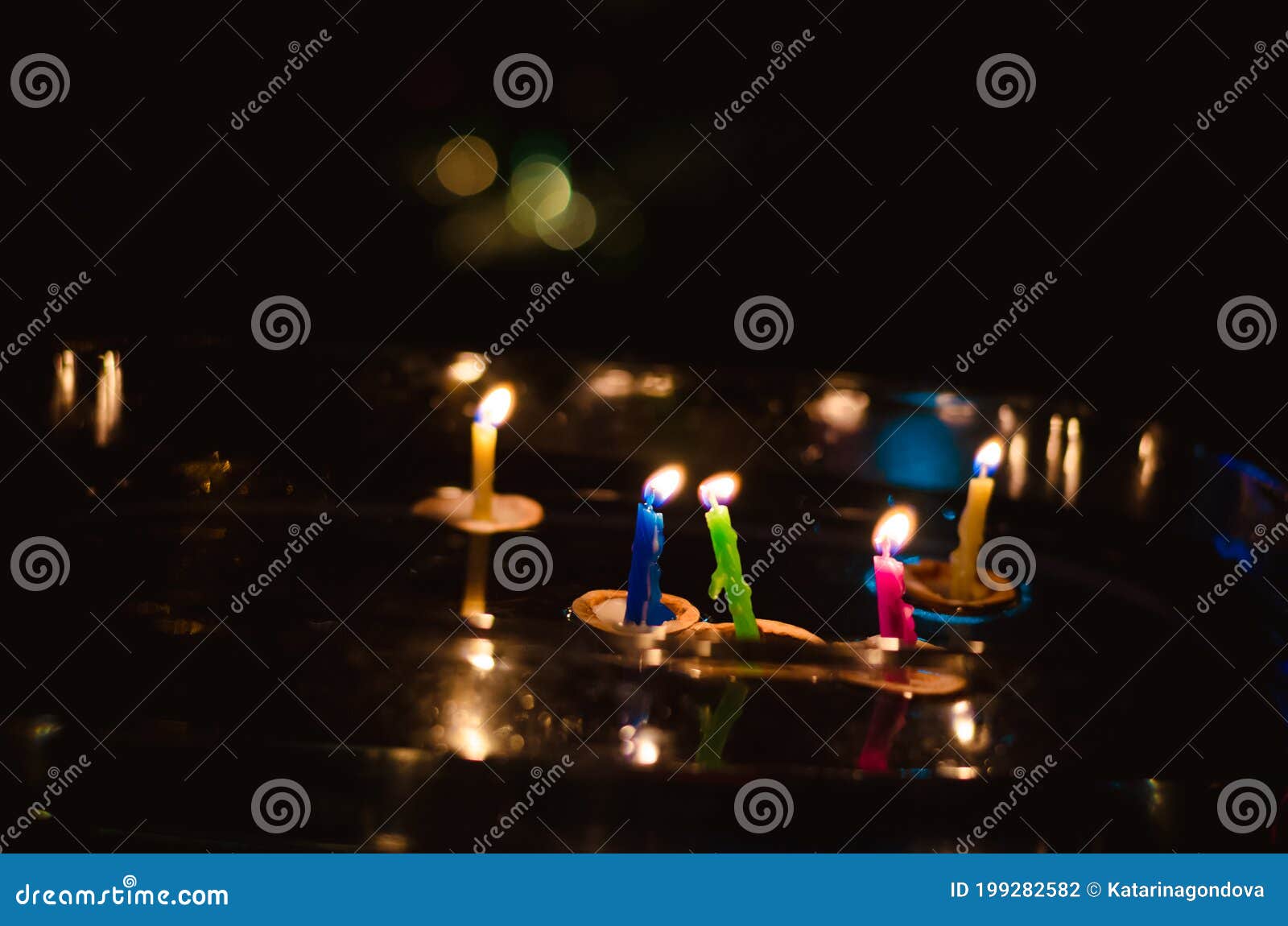 Nut Shell with Burning Candle Floating on Water Stock Photo - Image of ...
