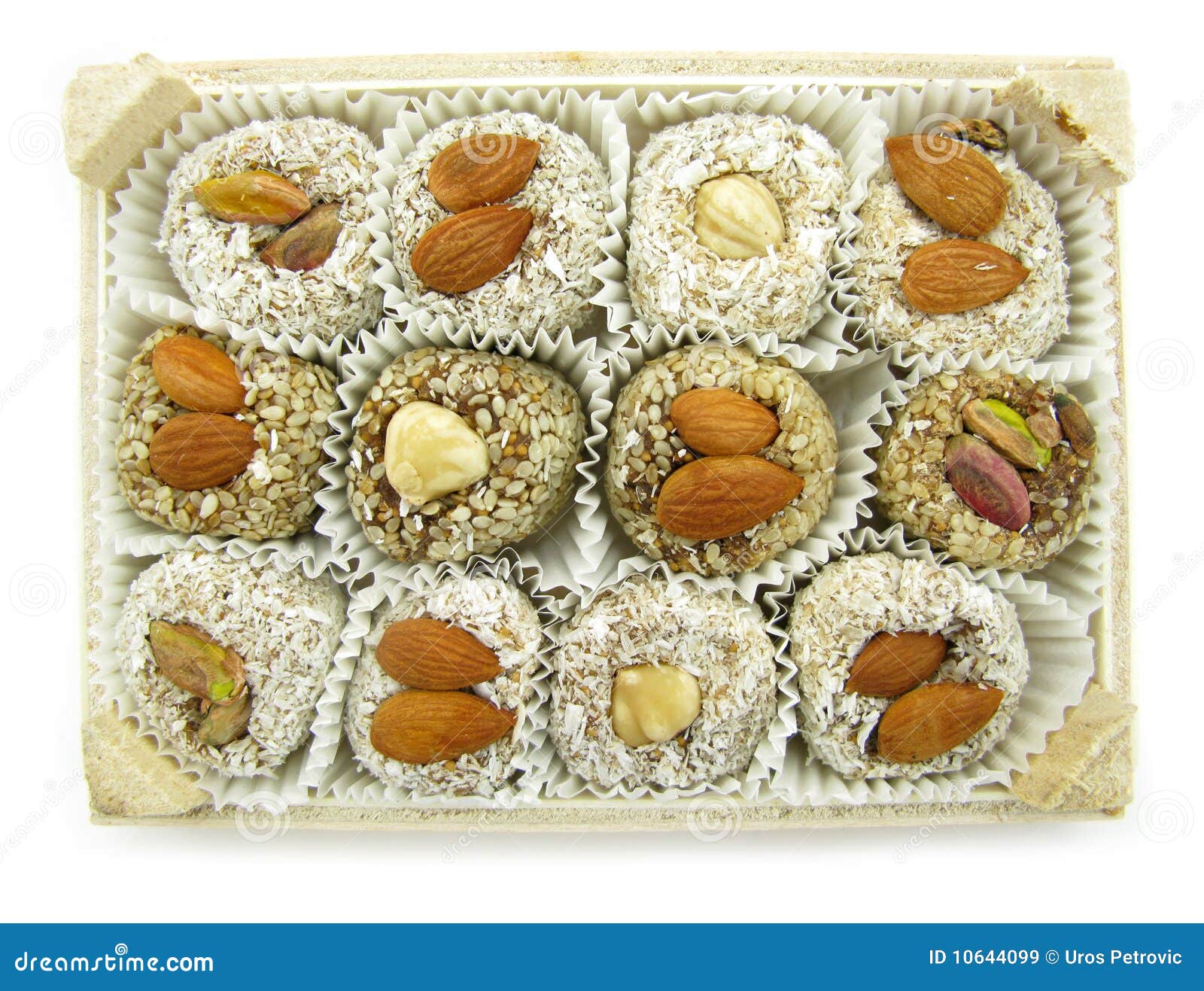 Nut topped cookies in box stock image. Image of almond - 10644099