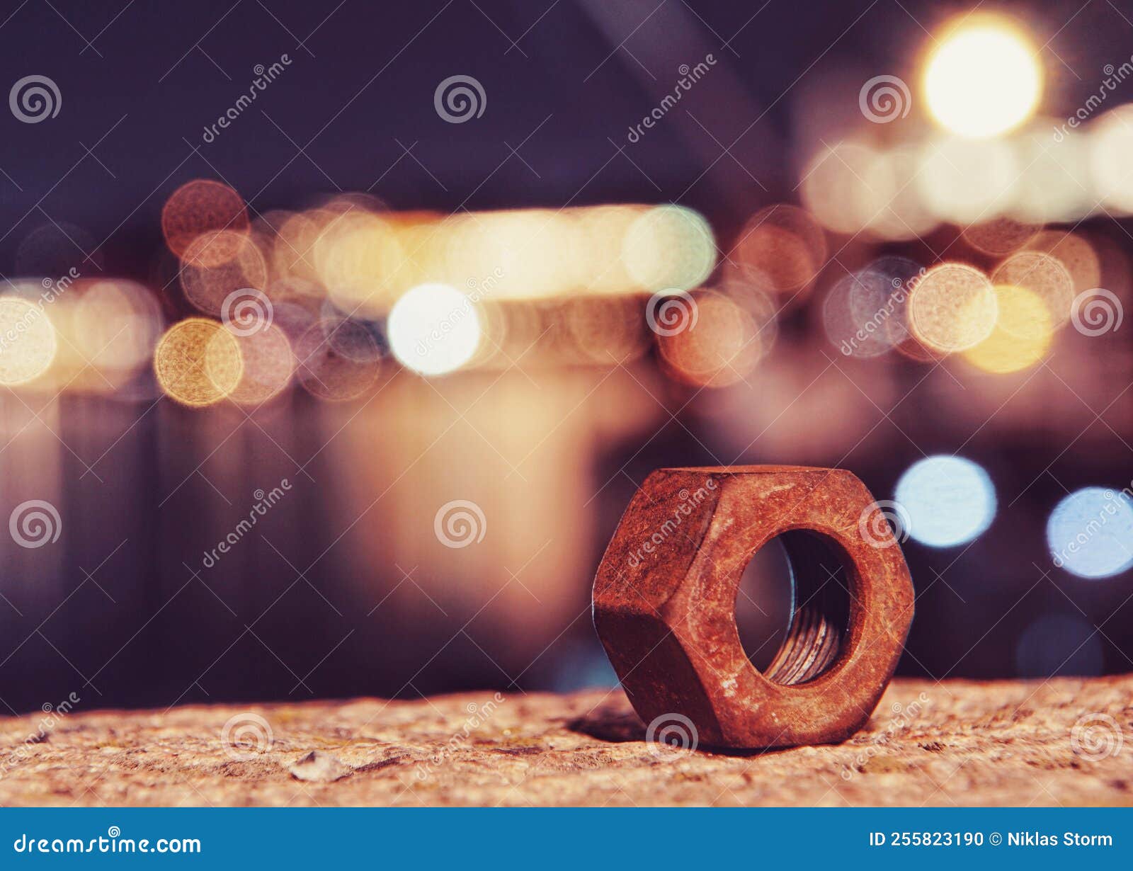 Nut on Wall in Front of City Stock Photo - Image of night, front: 255823190