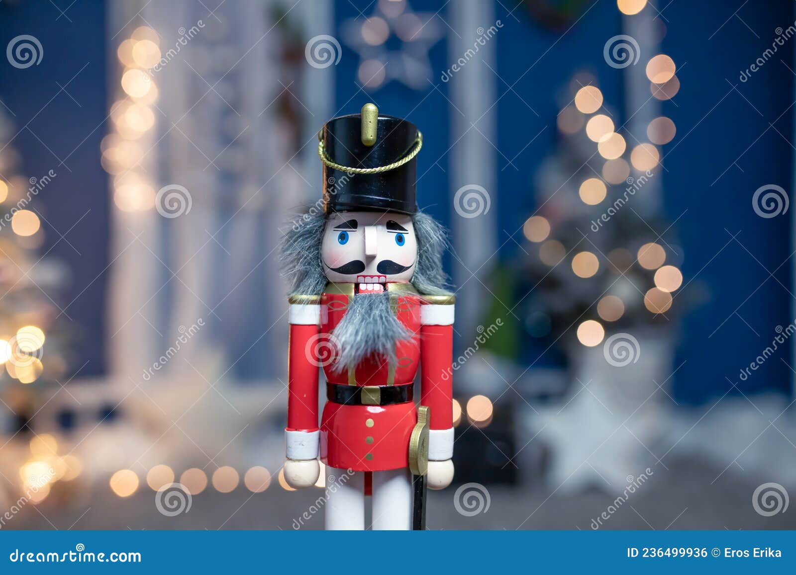 Nutcracker with Holiday Lighting Background Stock Photo - Image of ...