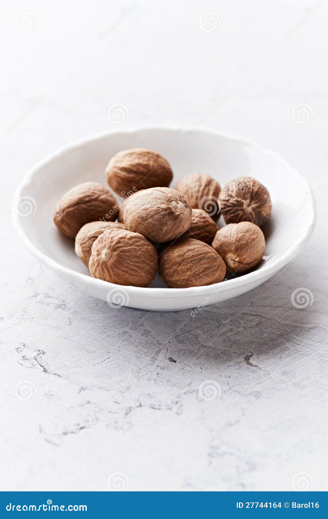 Nutmeg in small container stock photo. Image of flavor - 27744164