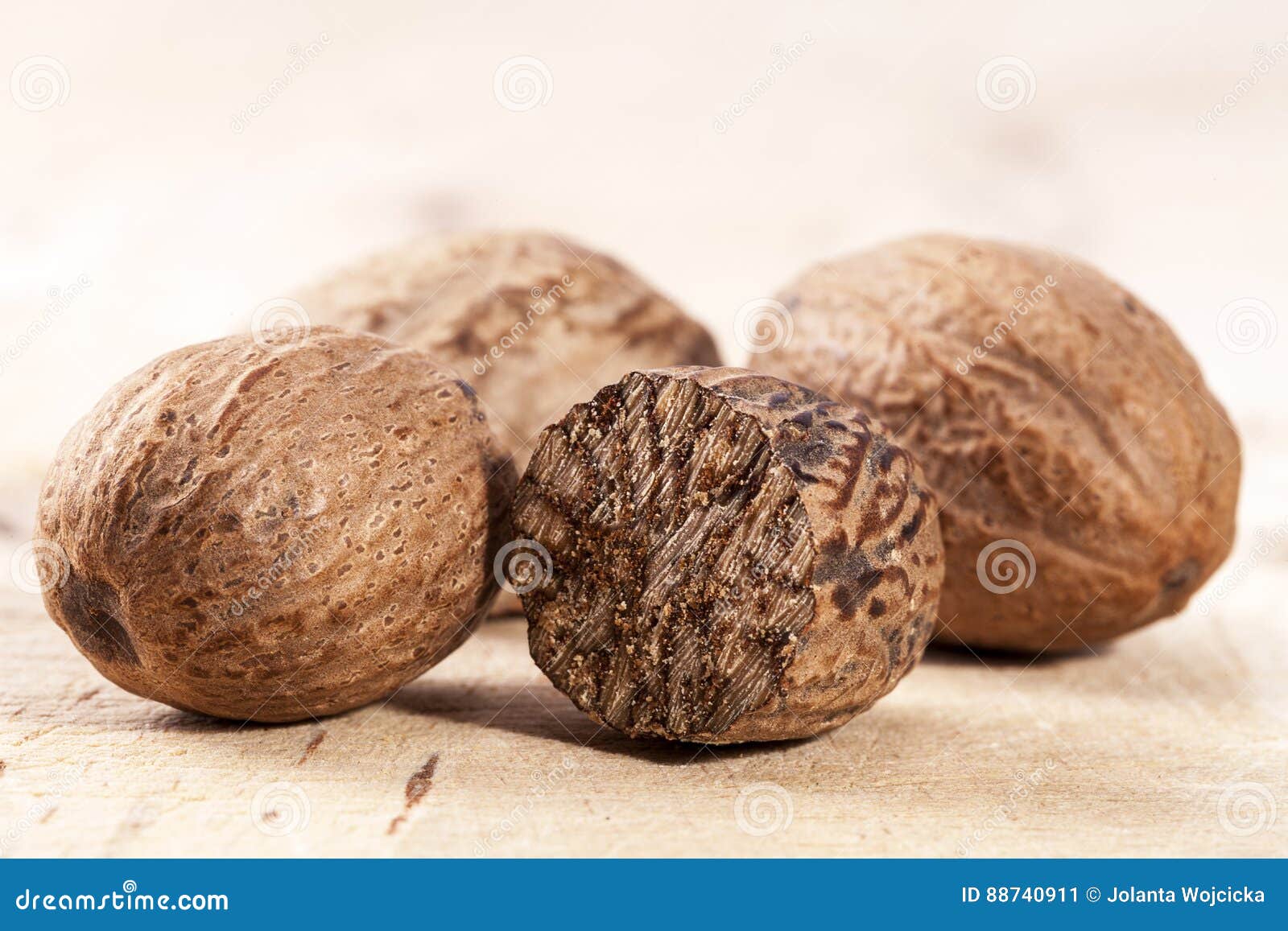 Nutmeg , Whole and Half on Wooden Plank Stock Image - Image of group ...
