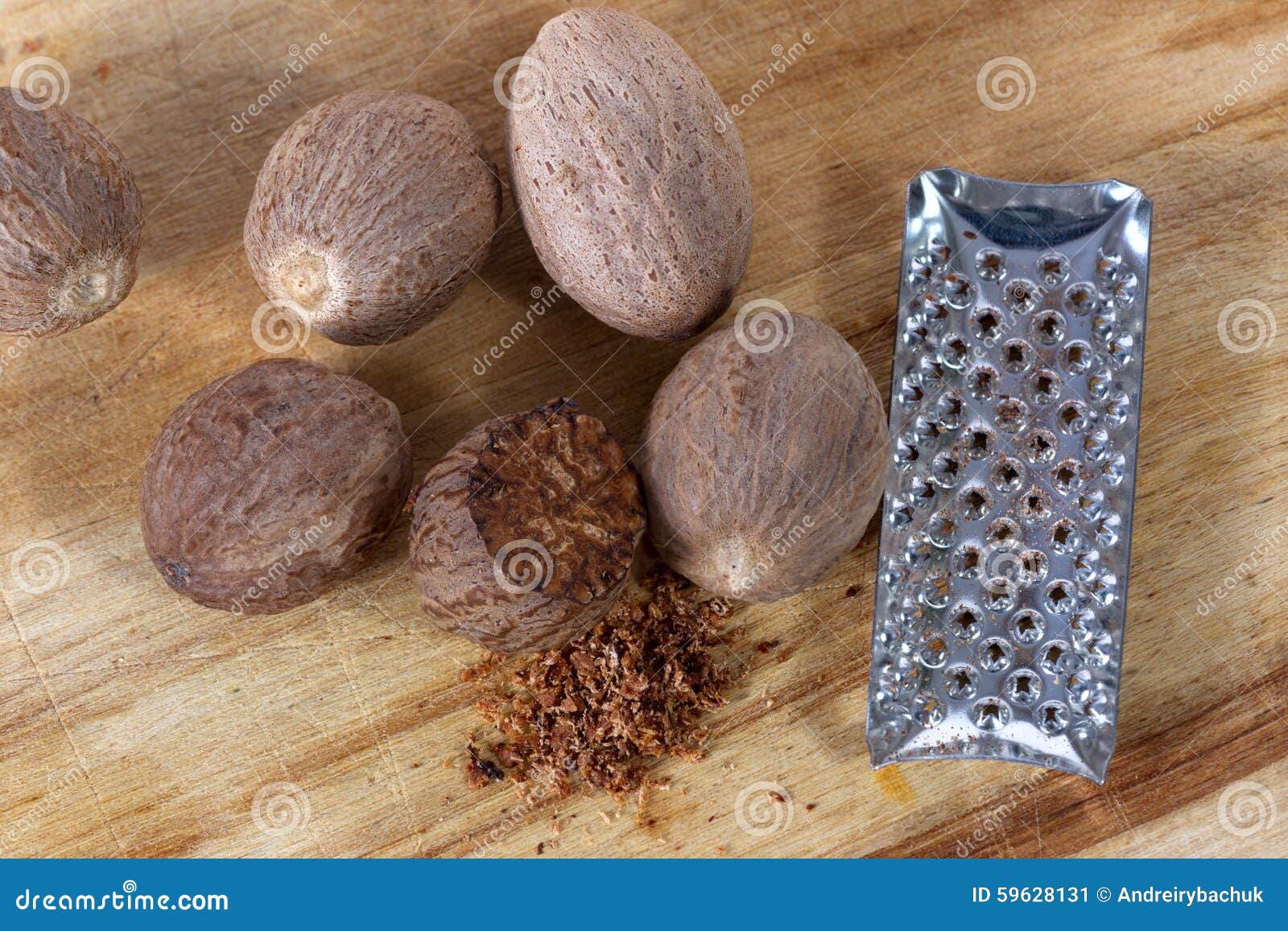 Nutmeg on woodtable stock image. Image of dish, ingredient - 59628131