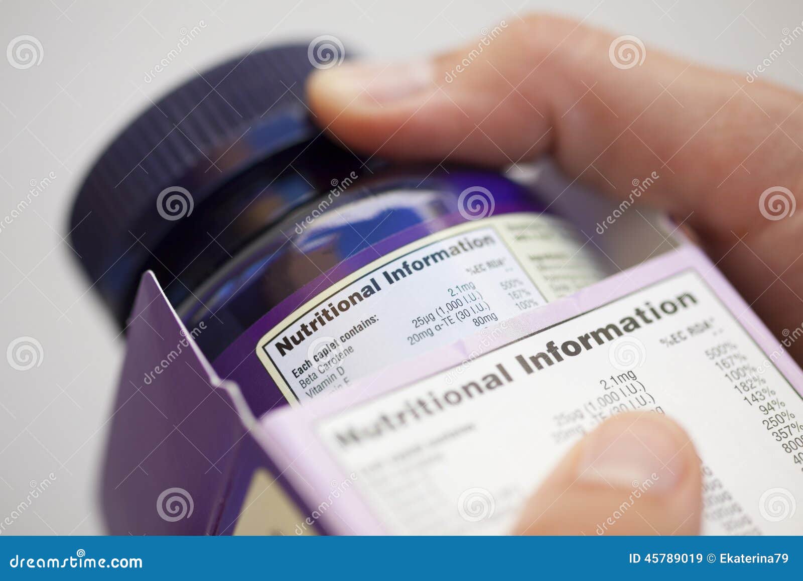Nutritional Information Concept. Hand Use The Magnifying Glass To Zoom ...