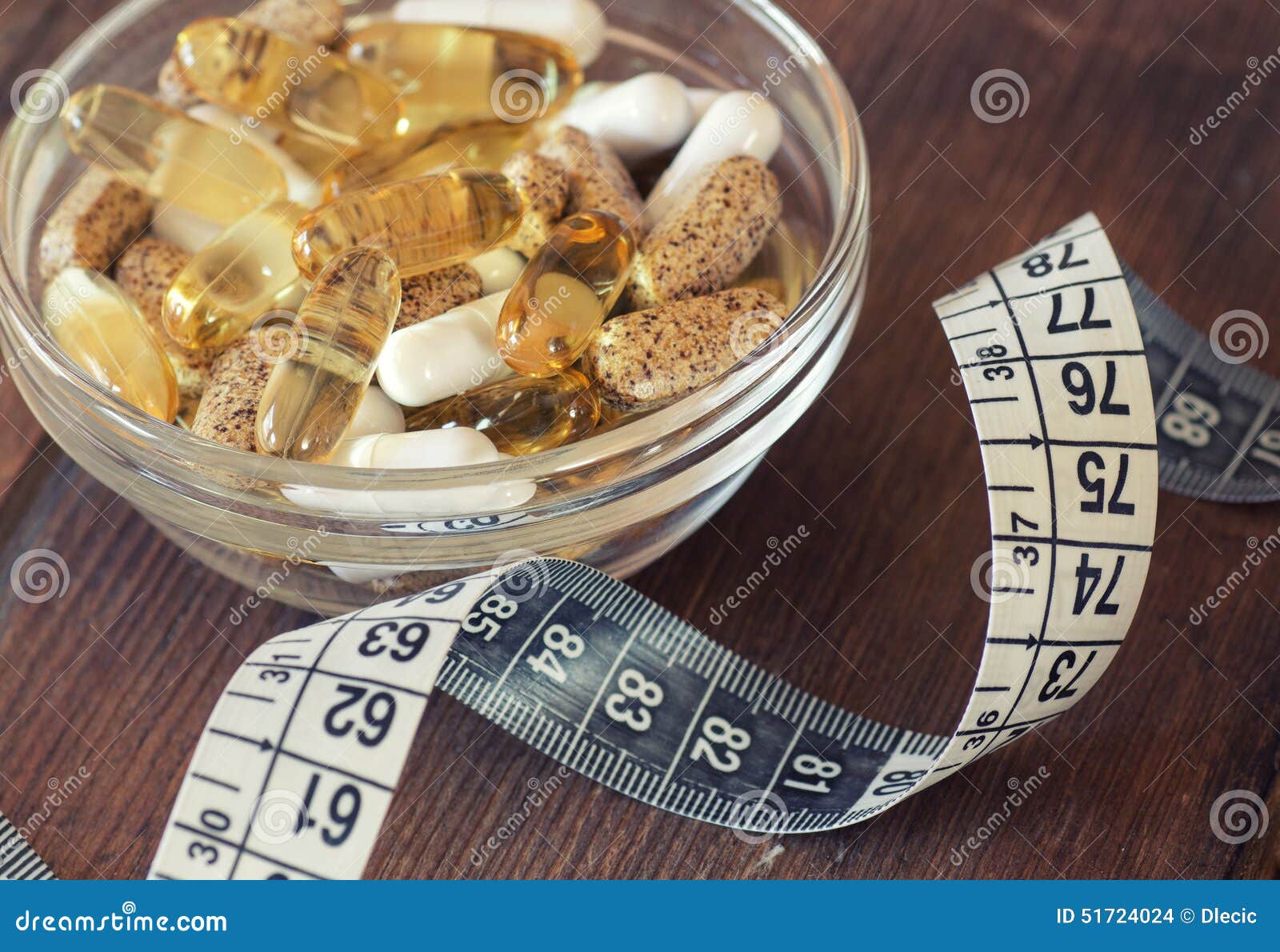 Nutritional Supplements in Capsules and Tablets, on Wooden Background ...