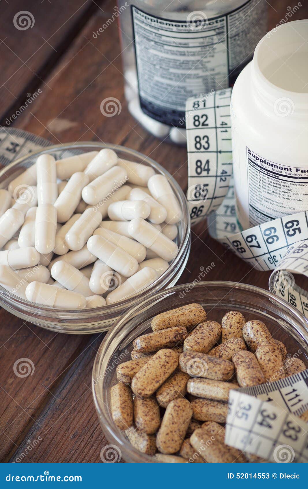 Nutritional Supplements in Capsules and Tablets, on Wooden Background ...
