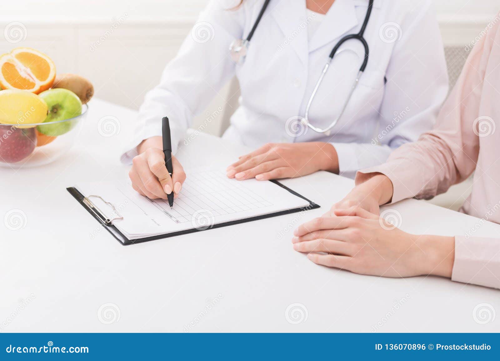 Nutritionist Explaining Personalized Diet Plan for Patient Stock Photo ...