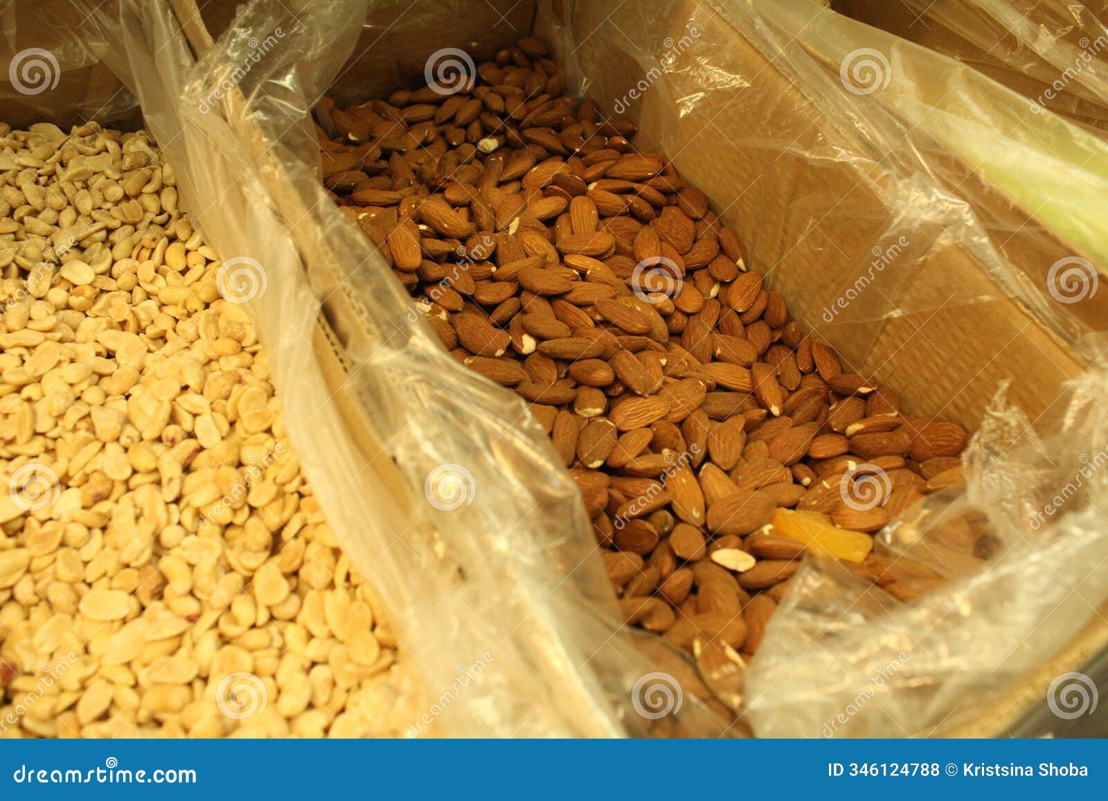 Nuts, Almonds and Peanuts in Boxes and Bags in the Store. Purchase and ...