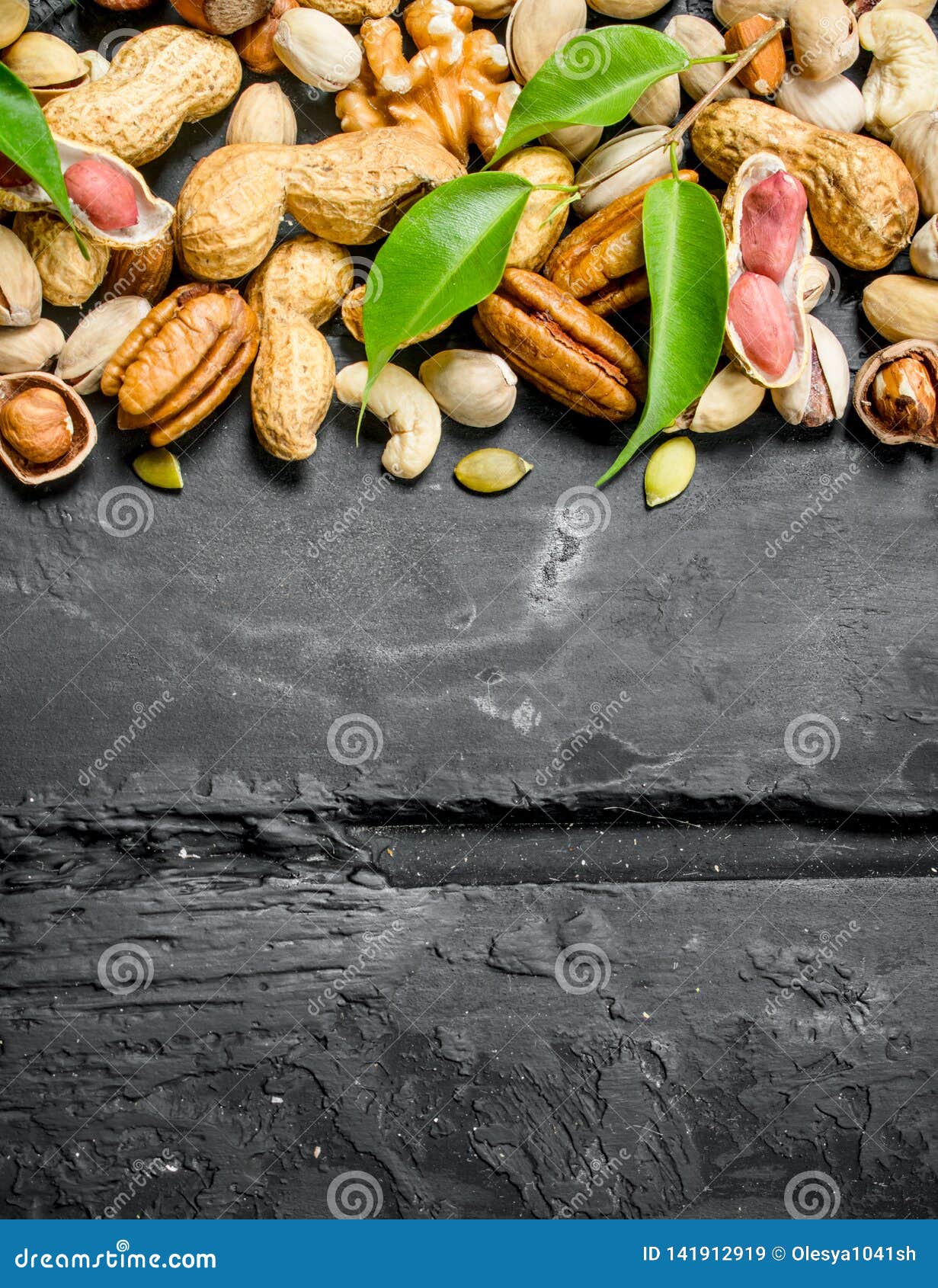 Nuts Background. Different Kinds of Nuts with Leaves Stock Image ...