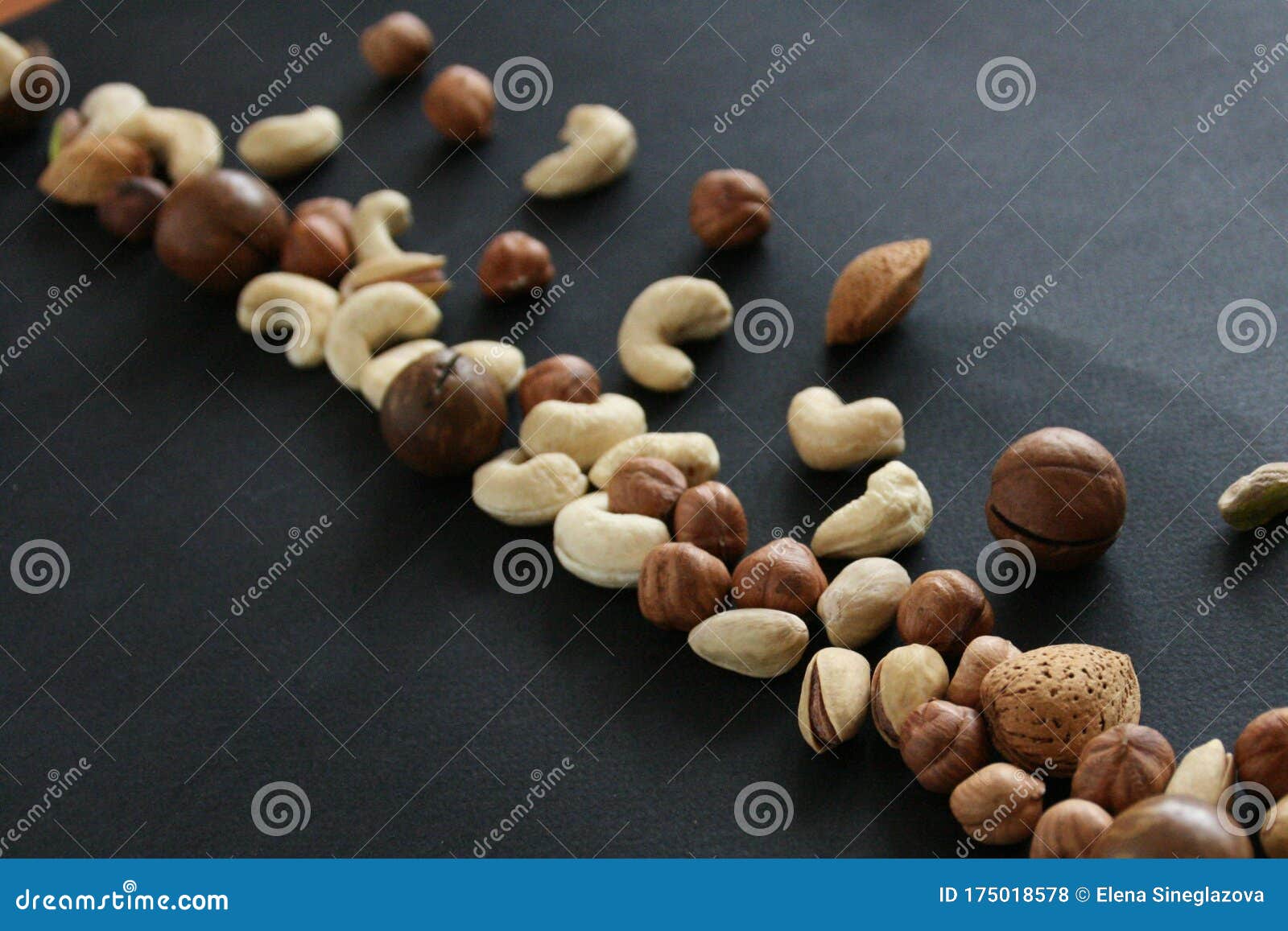 Nuts on Dark Background, Top View with Copyspace. Stock Photo - Image ...