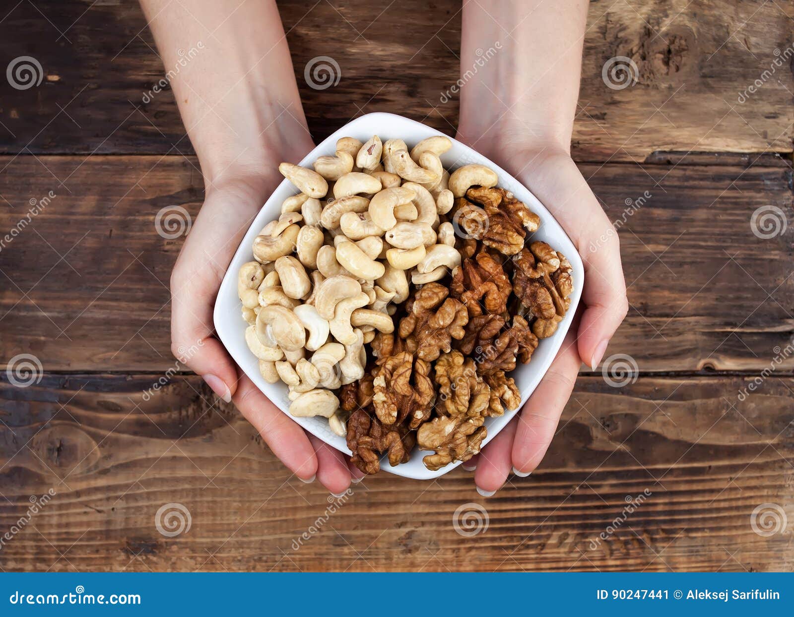 Nuts in hands stock image. Image of heart, cashew, brown - 90247441