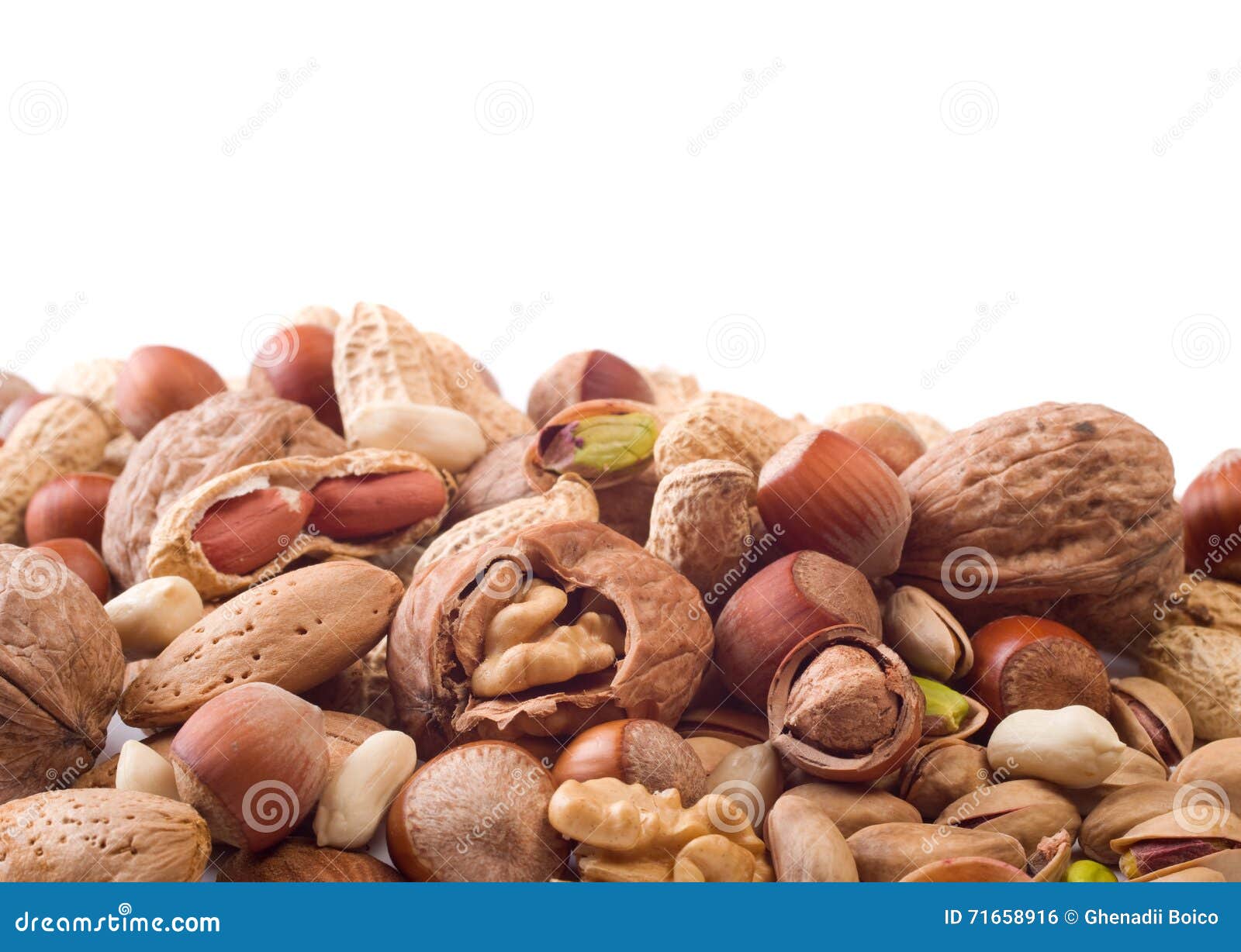 Nuts isolated on white stock photo. Image of ingredient - 71658916