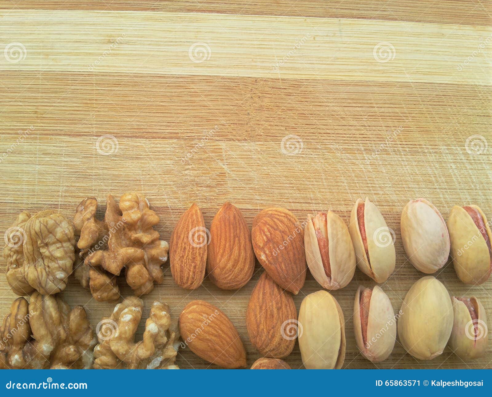 Nuts Line on Wooden Background Stock Image - Image of background ...