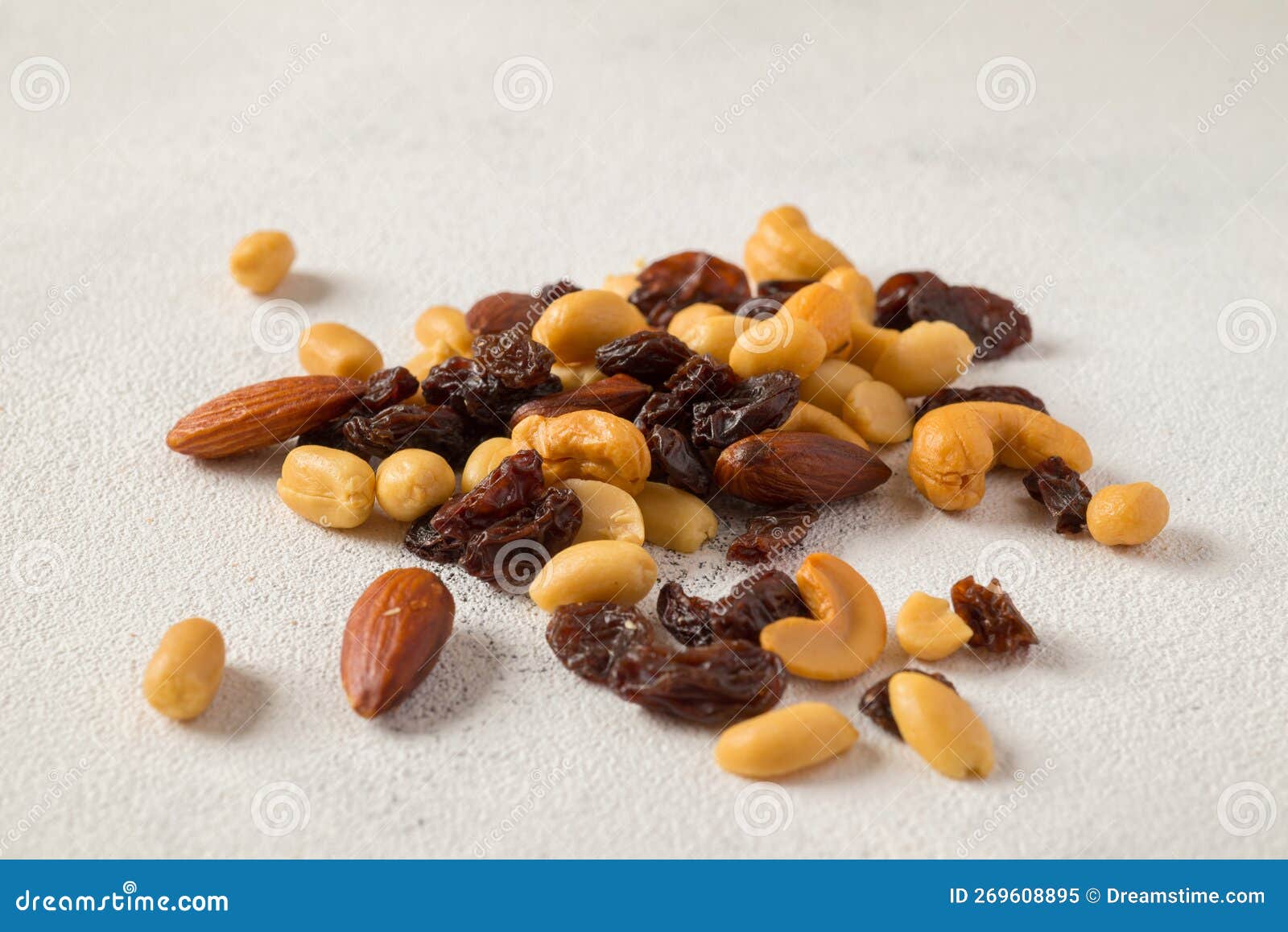 Nuts Mixture of Almond, Cashew, Peanut and Raisin on Table Stock Image ...