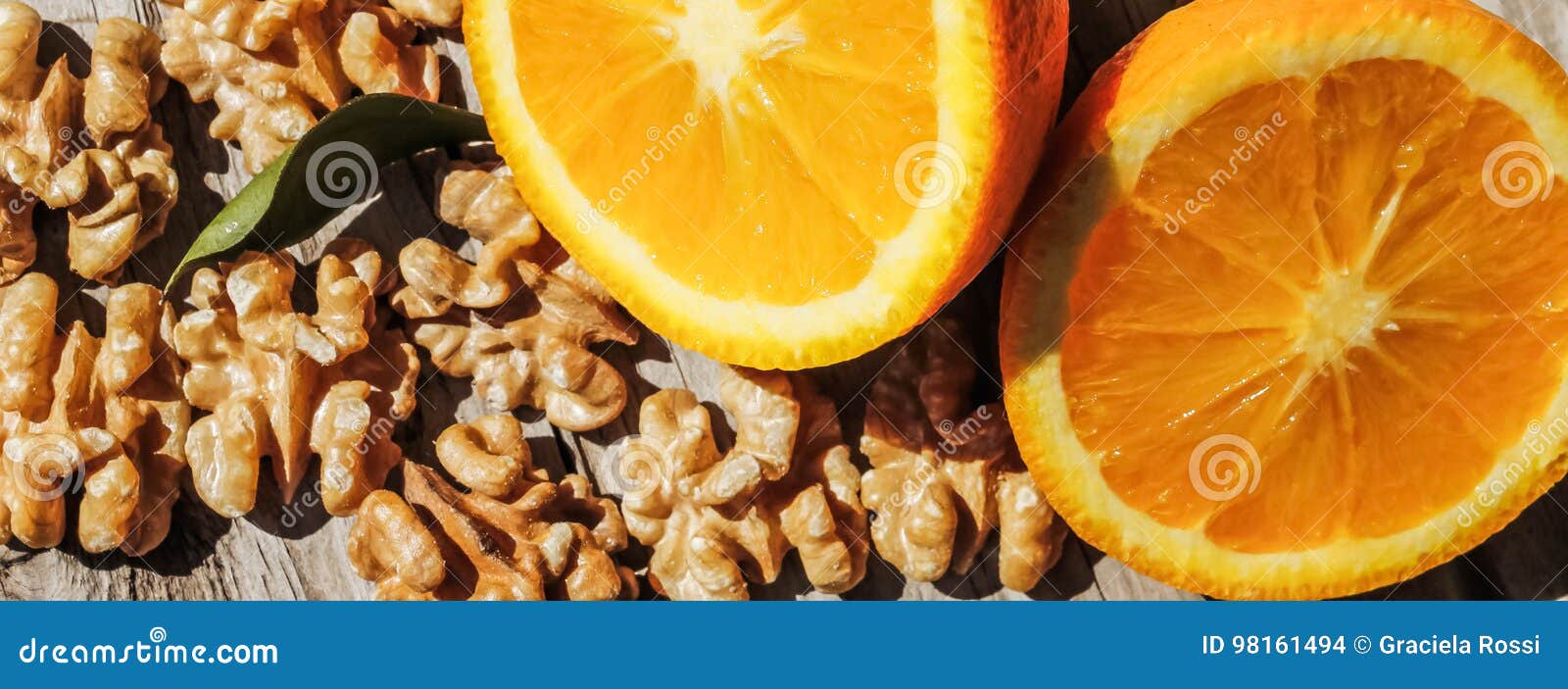 Nuts and orange stock photo. Image of dessert, freshness - 98161494