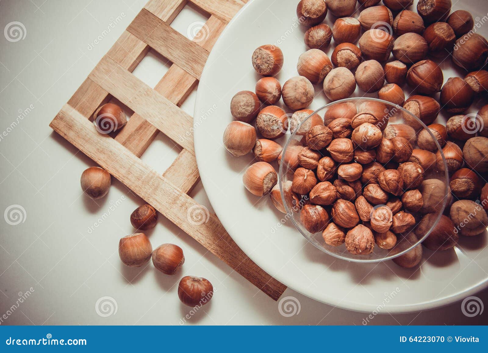 Nuts on plate stock photo. Image of natural, background - 64223070
