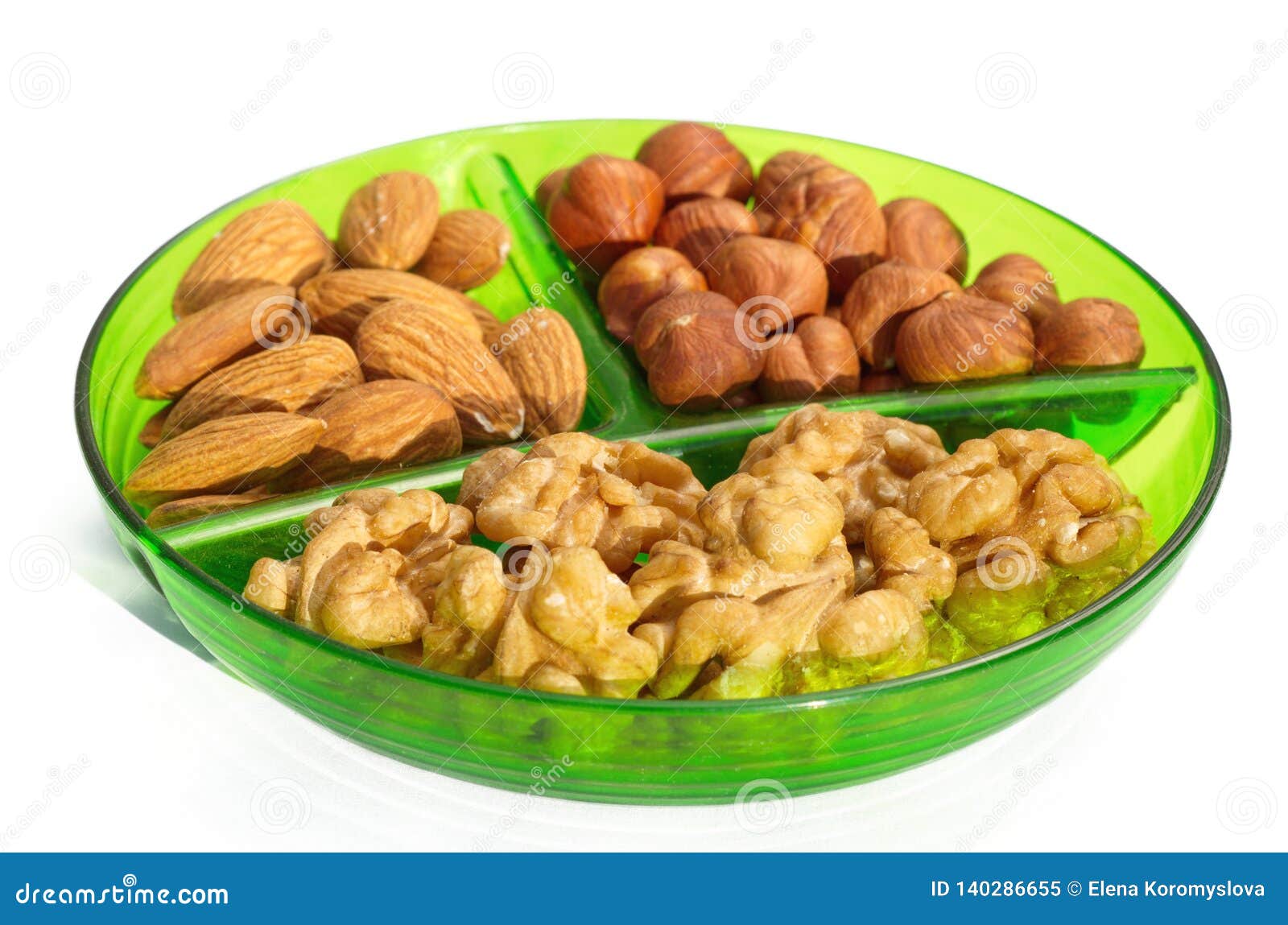 Nuts on a Plate on a White Background Stock Image - Image of ingredient ...
