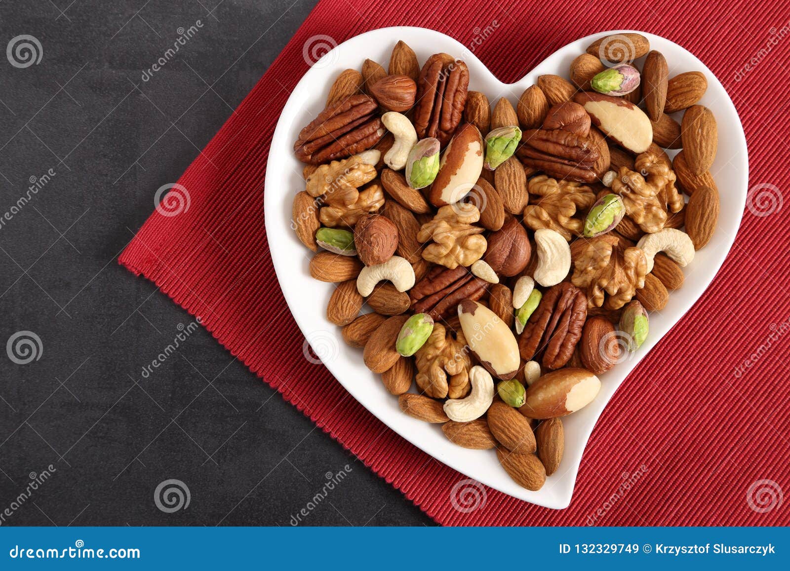 Nuts on a Plate in the Shape of a Heart Stock Image - Image of cashew ...