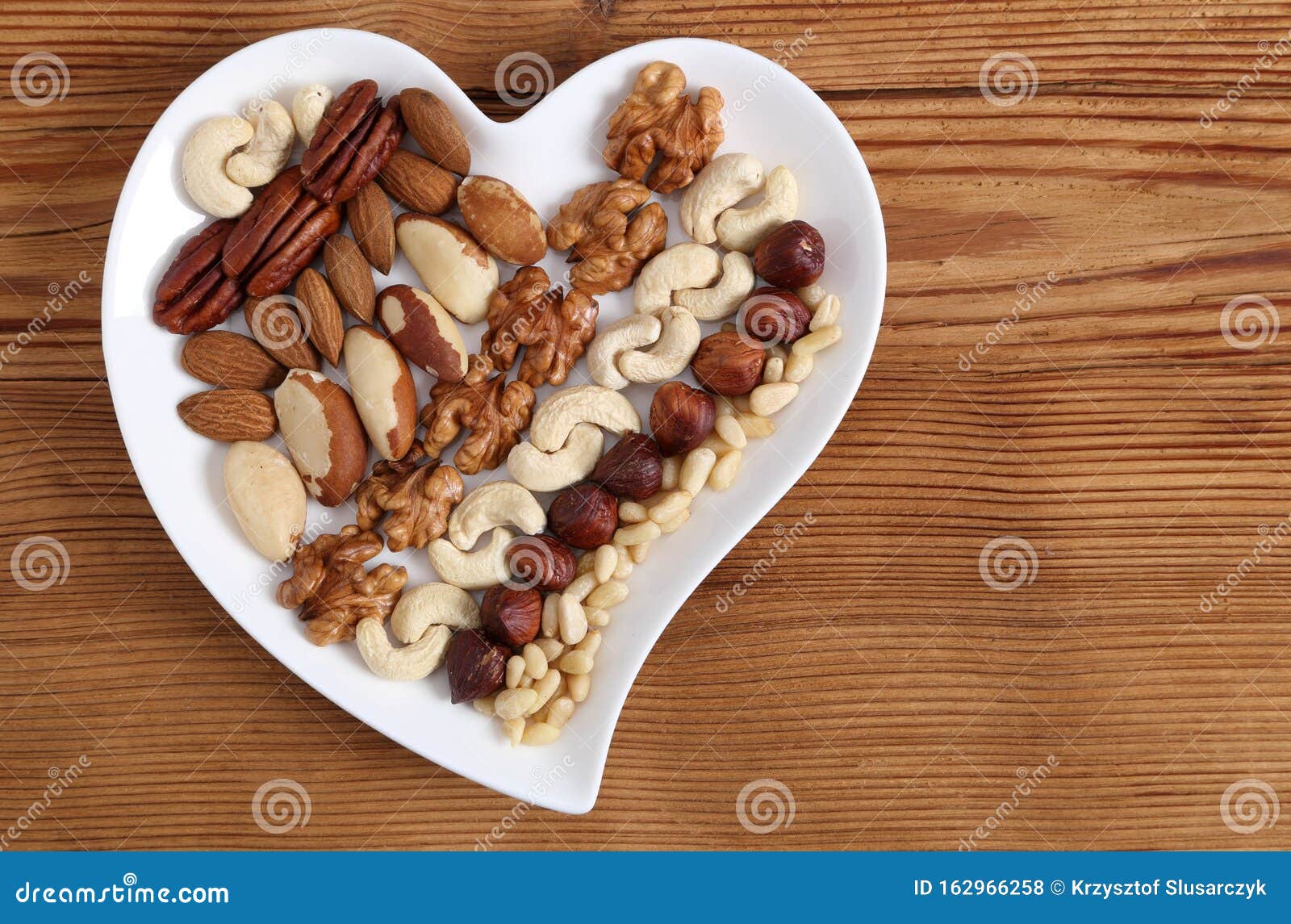 Nuts on a Plate in the Shape of a Heart Stock Photo - Image of walnut ...