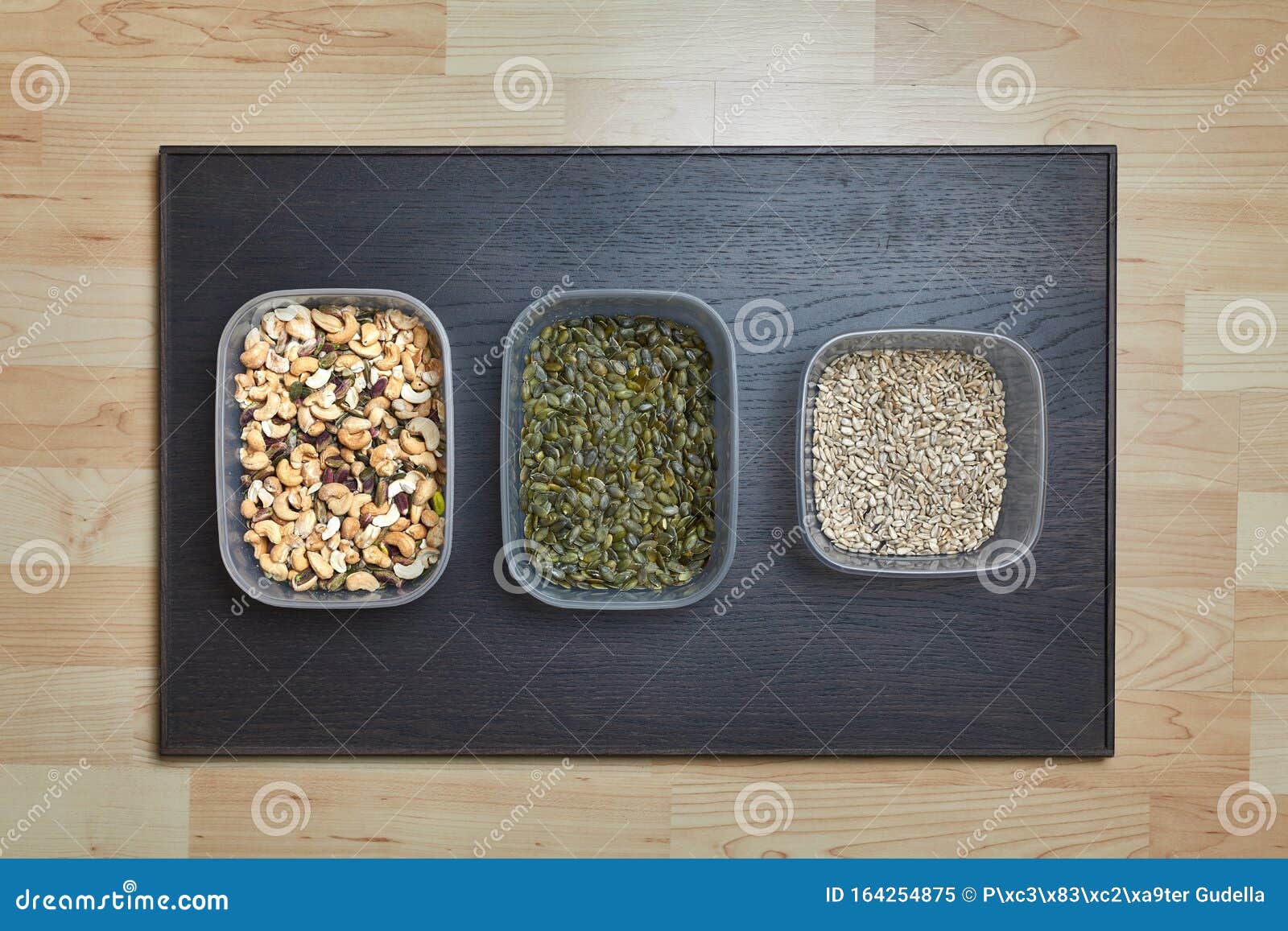 Nuts and seed in boxes stock image. Image of diet, pantry - 164254875
